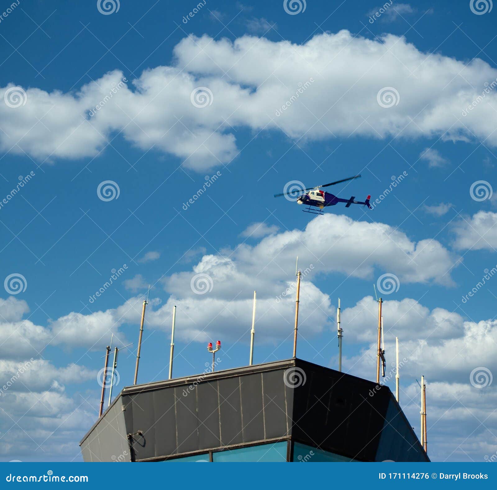 Helicopter Over Control Tower Stock Photo - Image of architecture ...