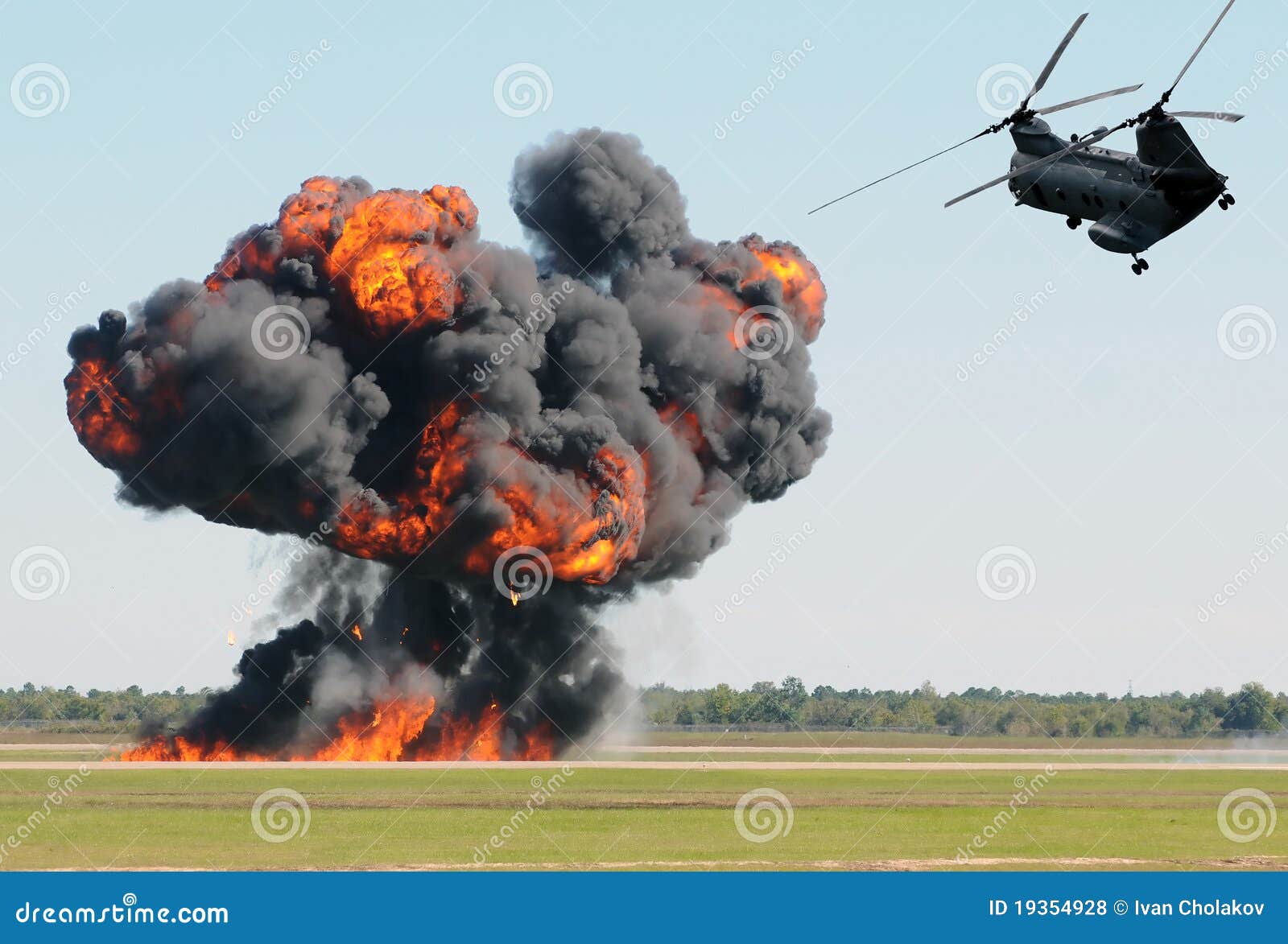 Helicopter over fire stock photo. Image of action, bomb - 19354928