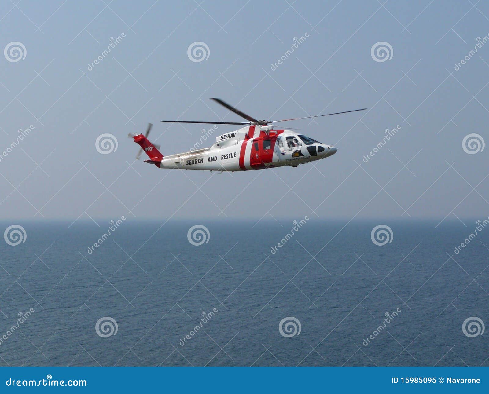 Helicopter over sea stock image. Image of flying, calm - 15985095