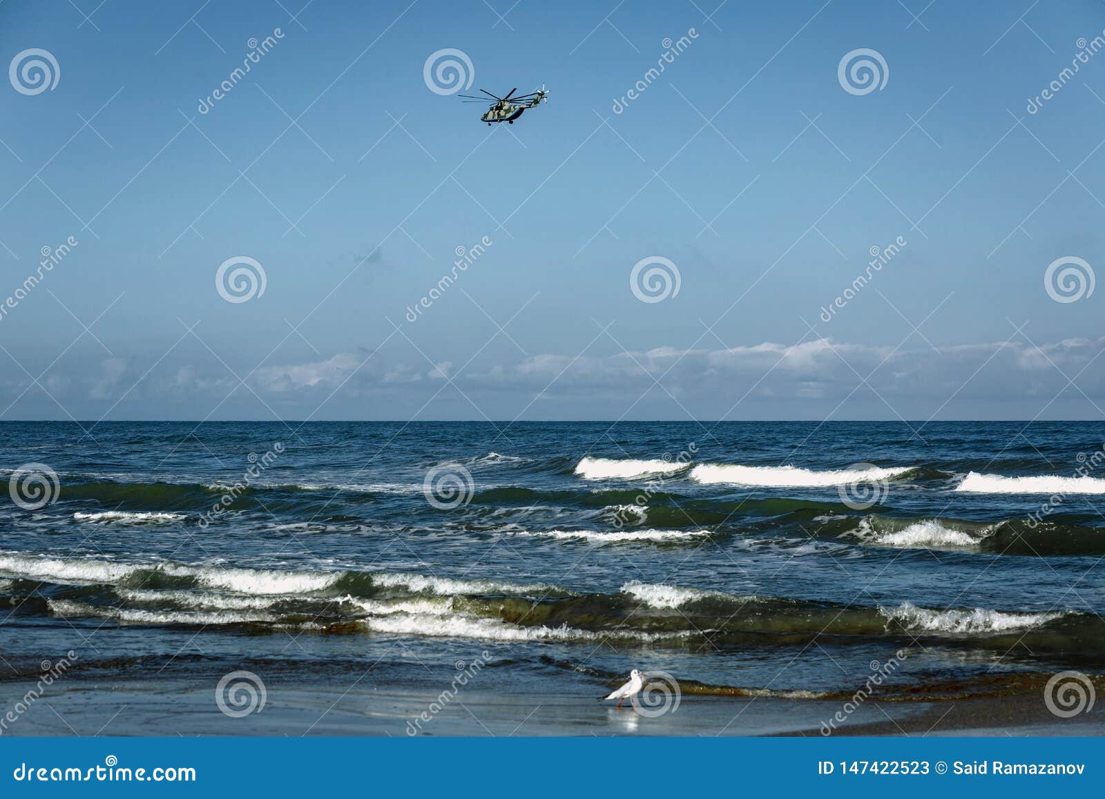 Helicopter Over the Sea Against the Cloudless Sky Stock Image - Image ...