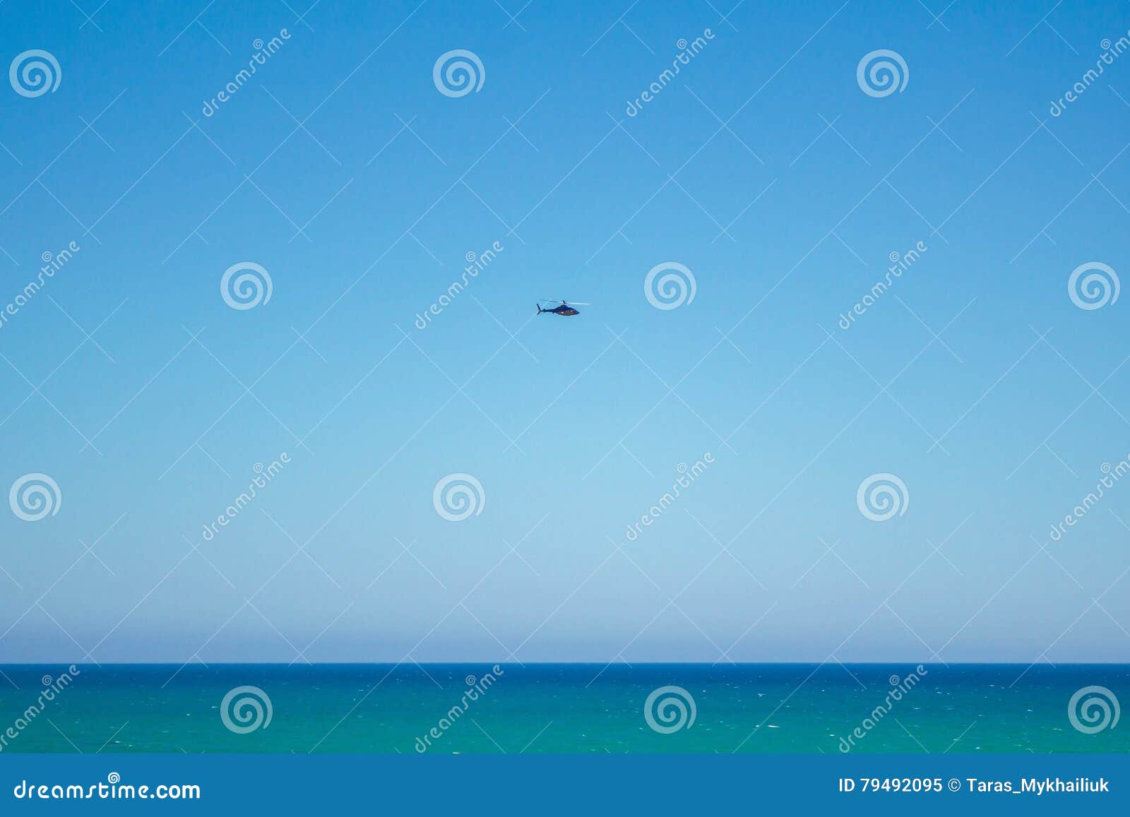 Helicopter over the sea stock image. Image of vehicle - 79492095