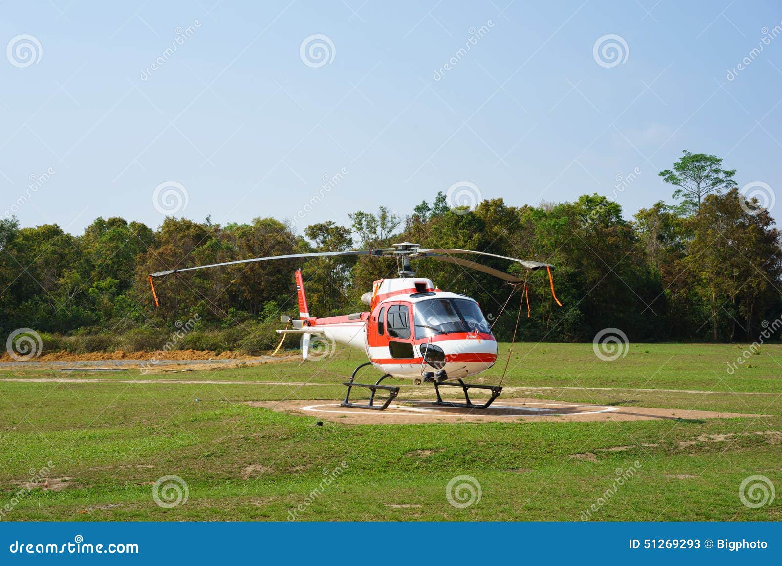 Helicopter Parked at the Helipad Near Forest Stock Image - Image of ...