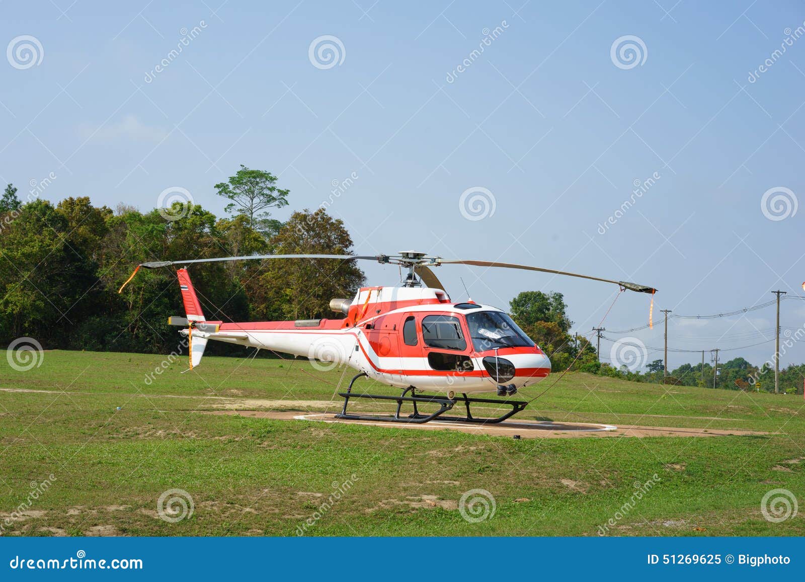Helicopter Parked at the Helipad Near Forest Stock Image - Image of ...