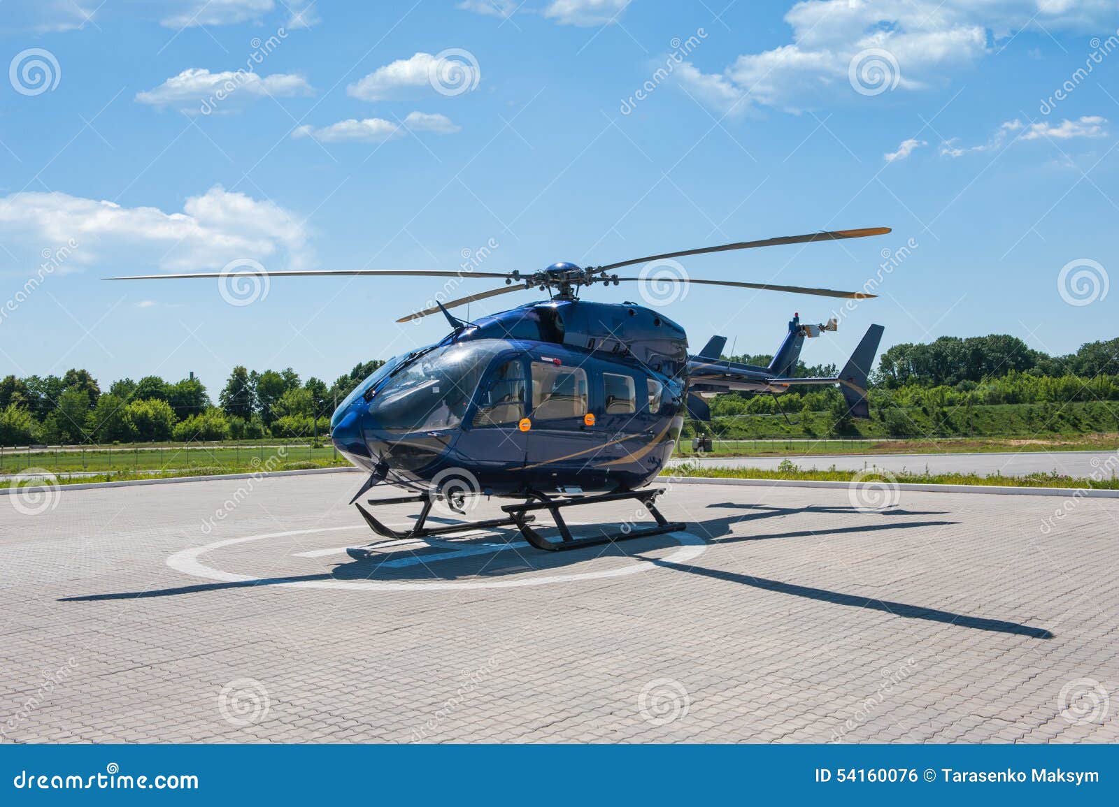 Helicopter Parked at the Helipad Stock Photo - Image of piloting, cloud ...