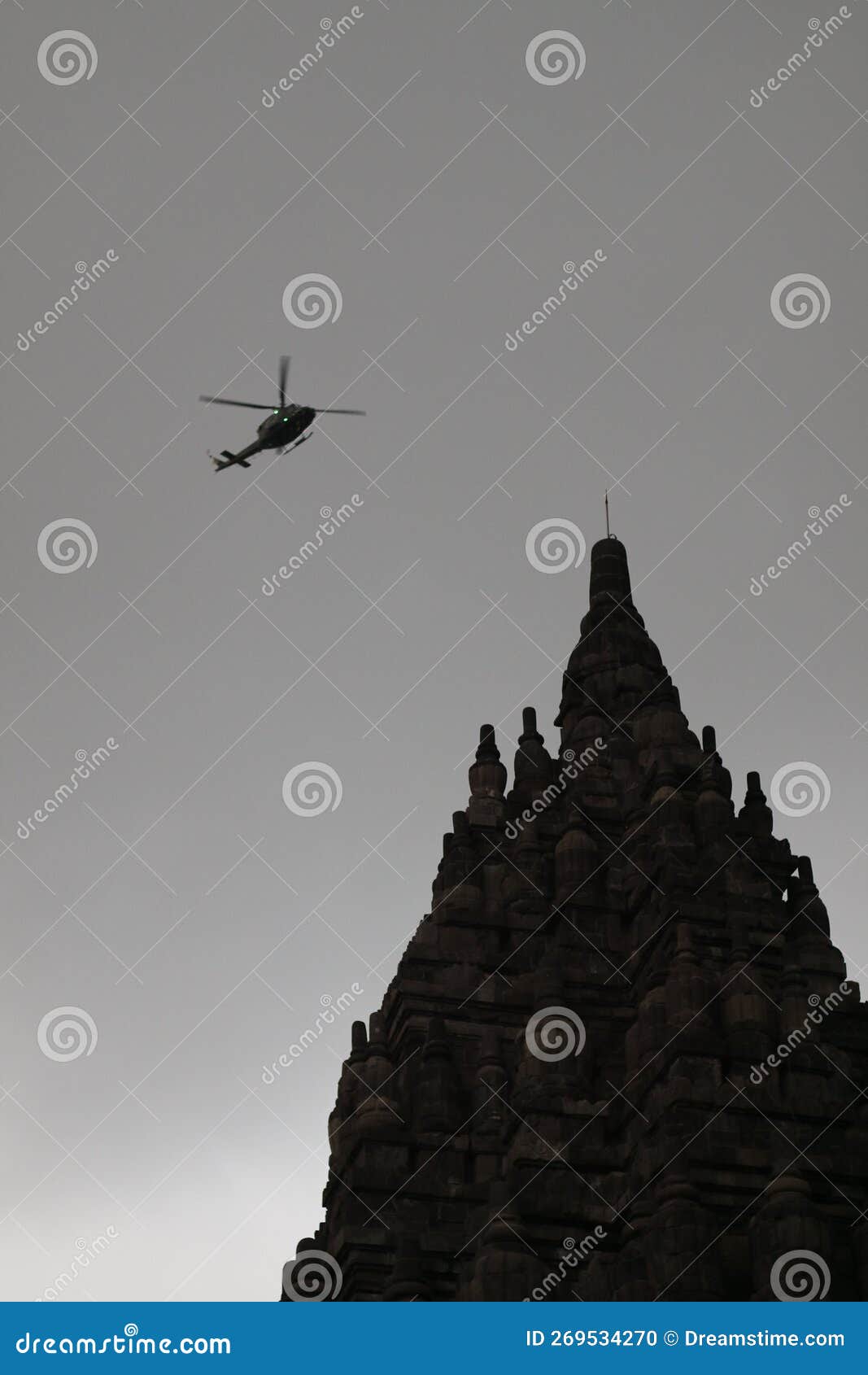 Helicopter Passing Above Prambanan Temple Stock Photo - Image of iron ...