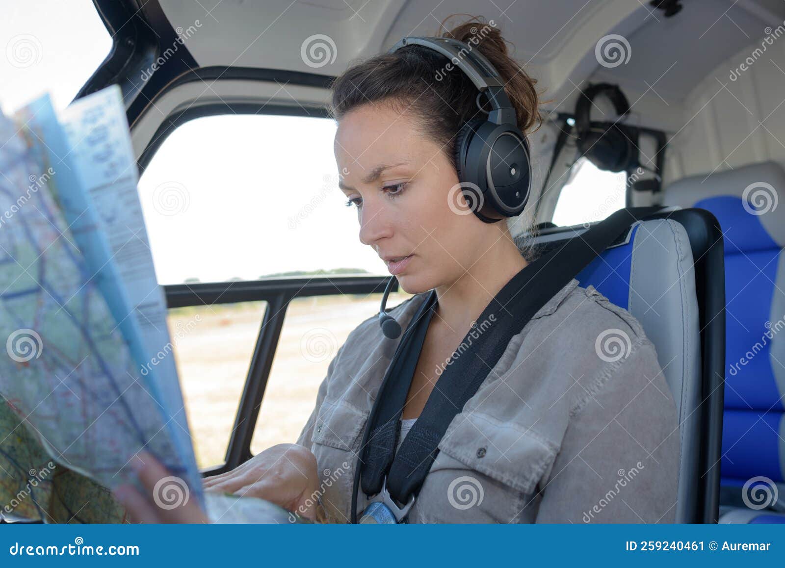 Helicopter Pilot Looking at Map Stock Image - Image of prepare ...