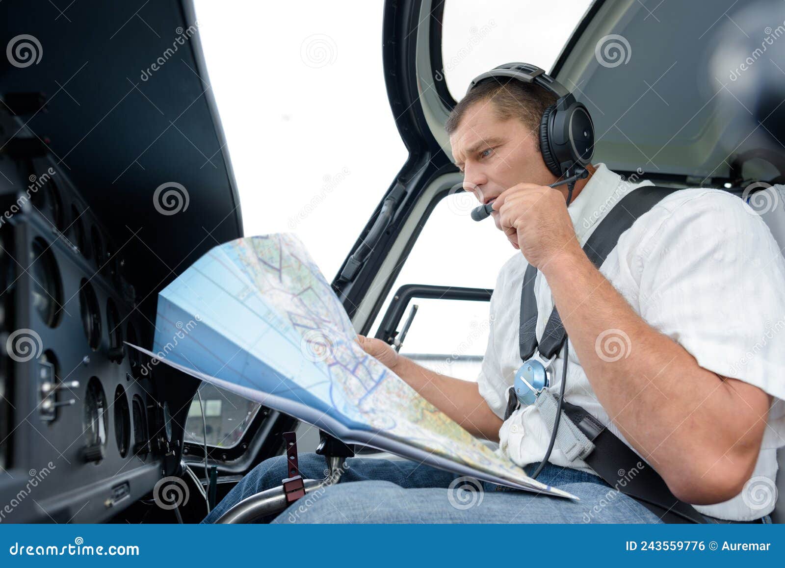 Helicopter Pilot Reading Map Stock Photo - Image of afterpilot ...
