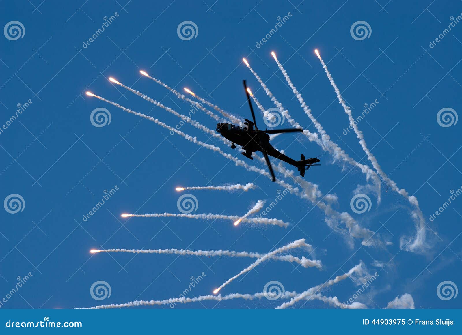 Helicopter Shooting Flares Stock Photography | CartoonDealer.com #44639936