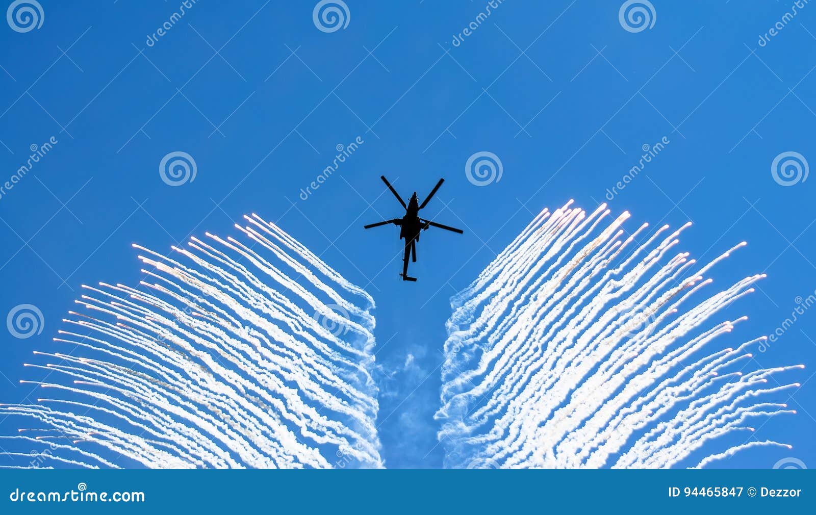 Helicopter Smoke a Rocket, in the Sky a Heat Trap. Stock Image - Image ...