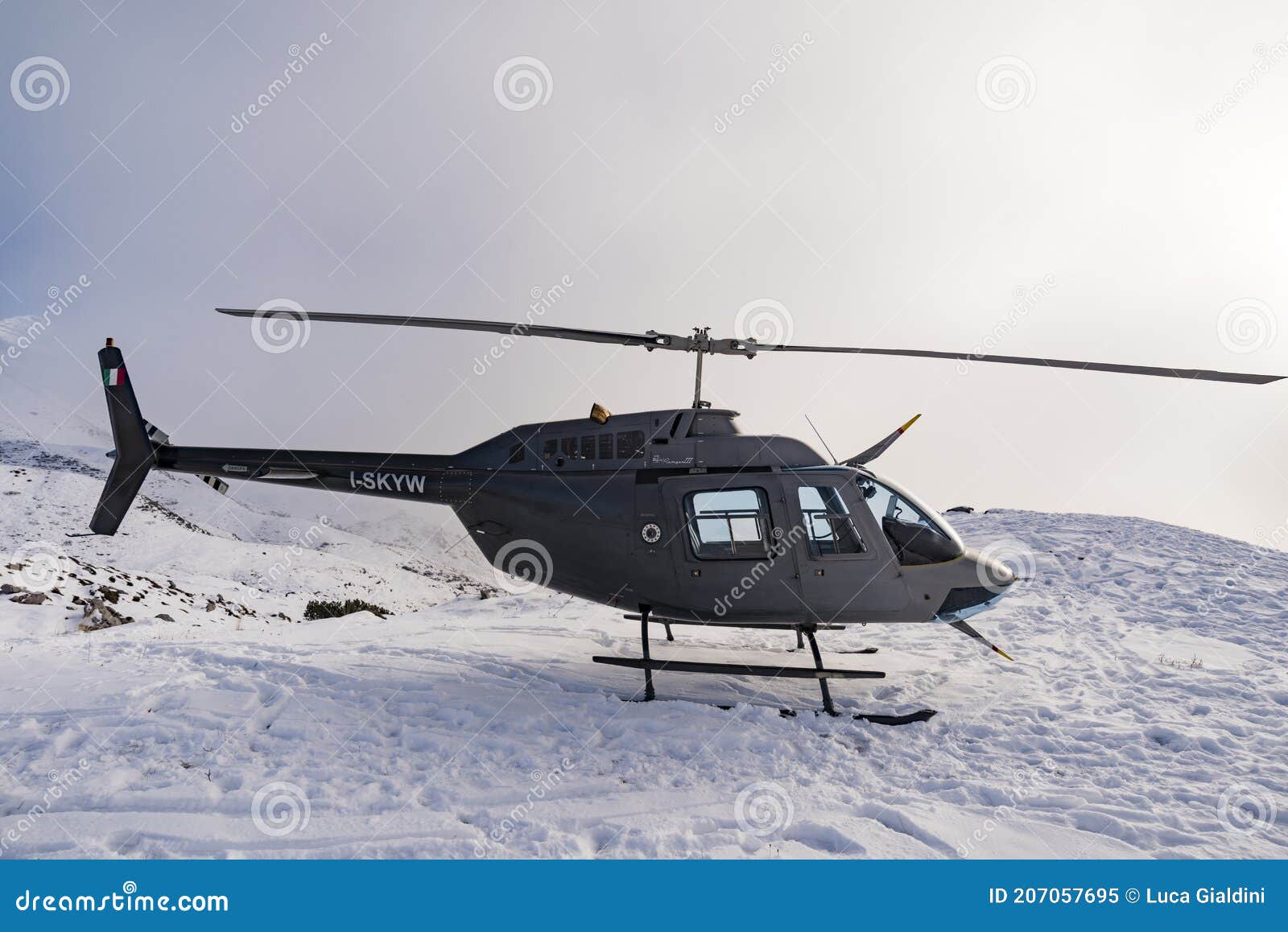 Helicopter on the snow editorial image. Image of view - 207057695