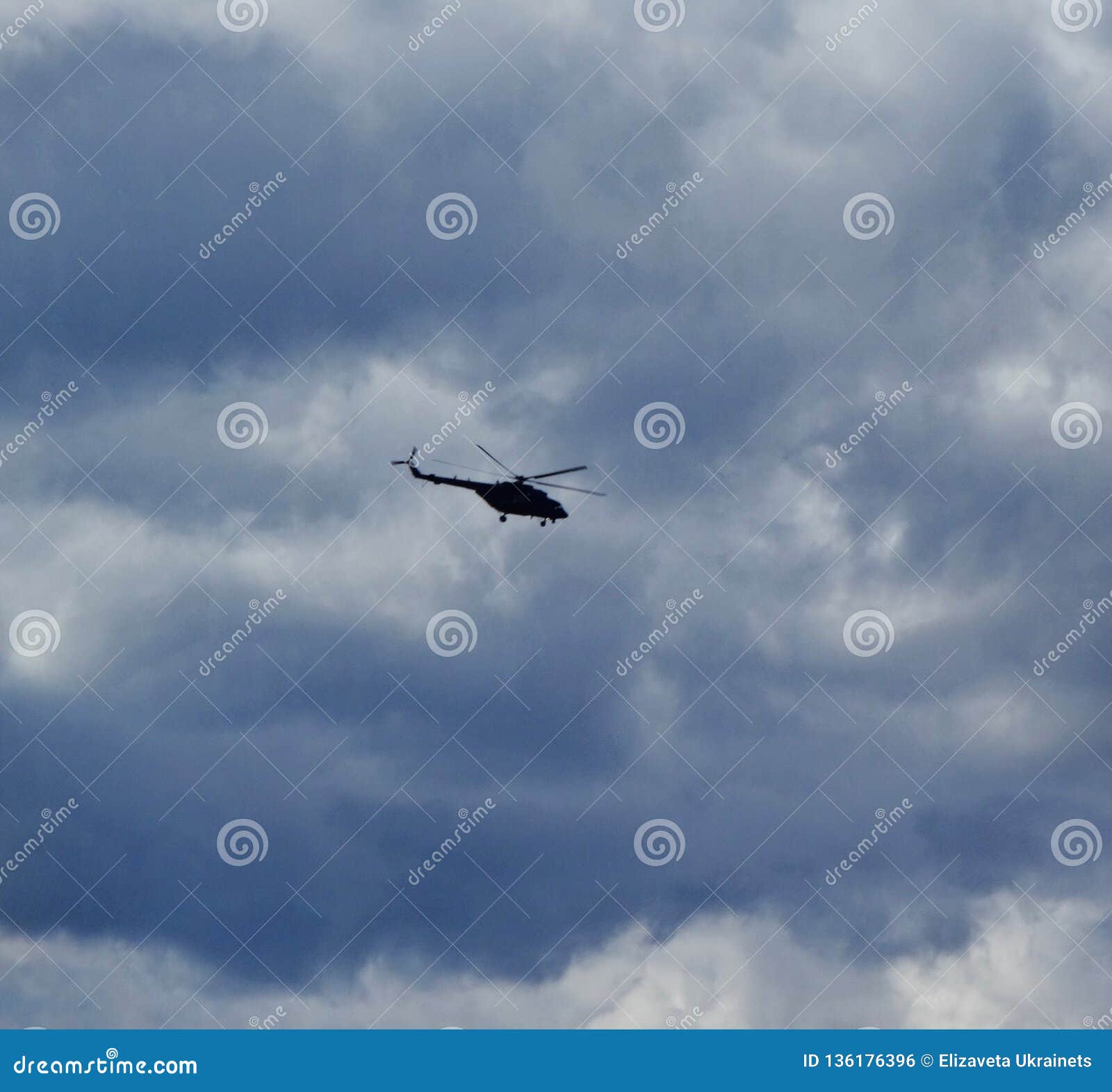 Helicopter in the Stormy Sky Stock Photo - Image of colors, autumn ...