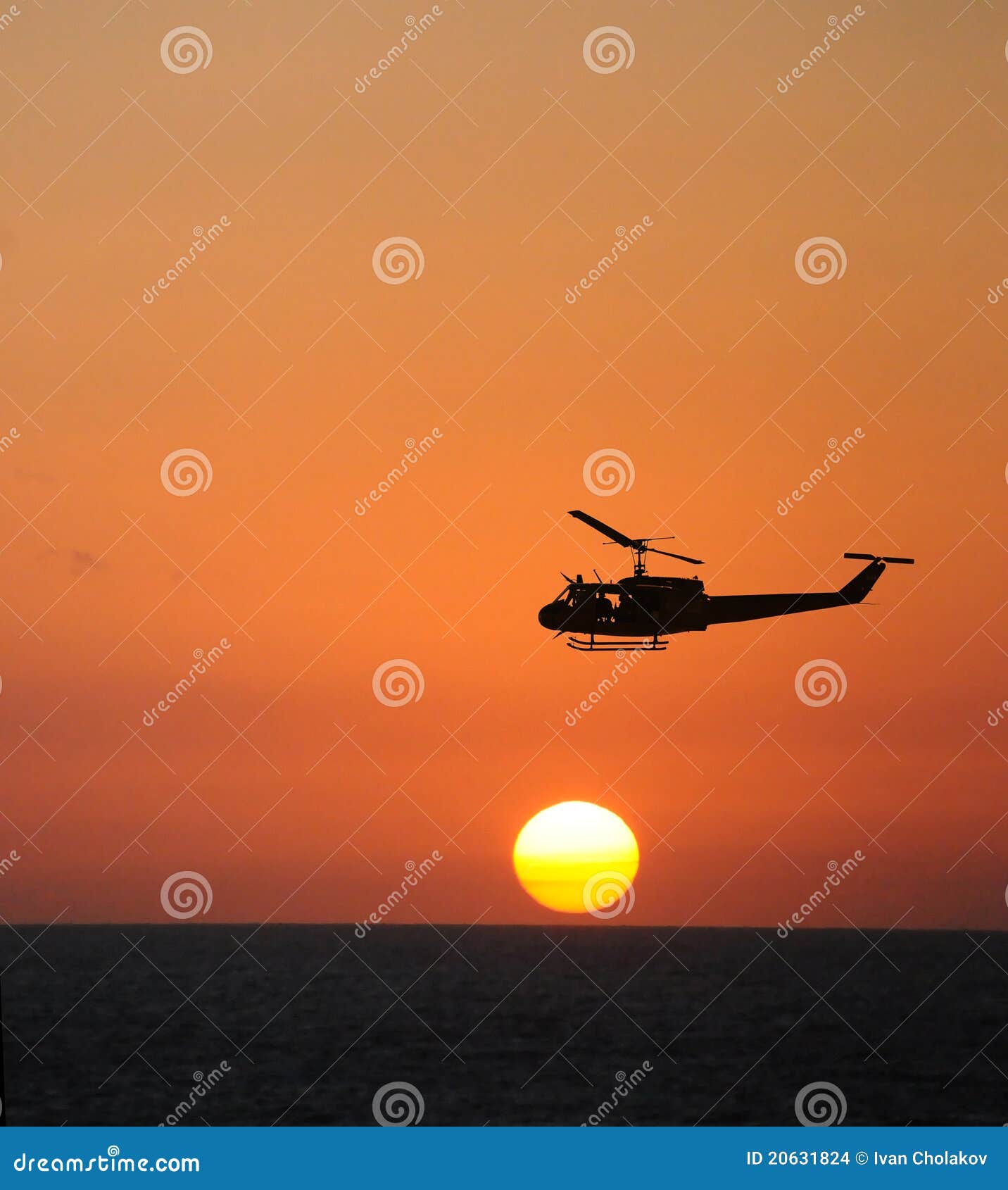 Helicopter at sunset stock photo. Image of water, chopper - 20631824