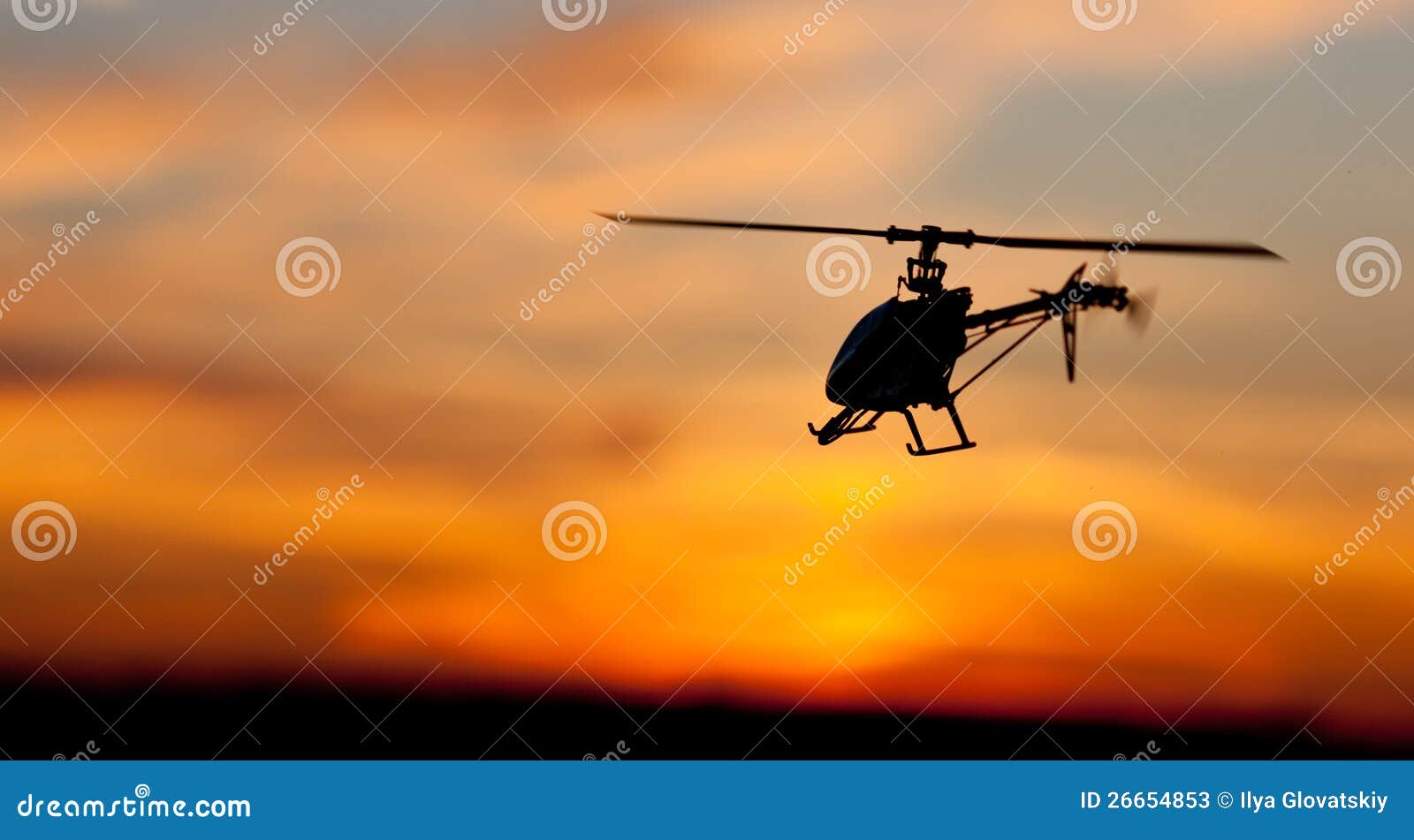 Helicopter at sunset stock image. Image of landscape - 26654853