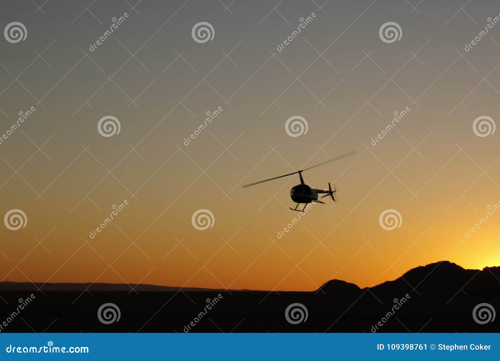 Helicopter sunset stock image. Image of africa, colours - 109398761