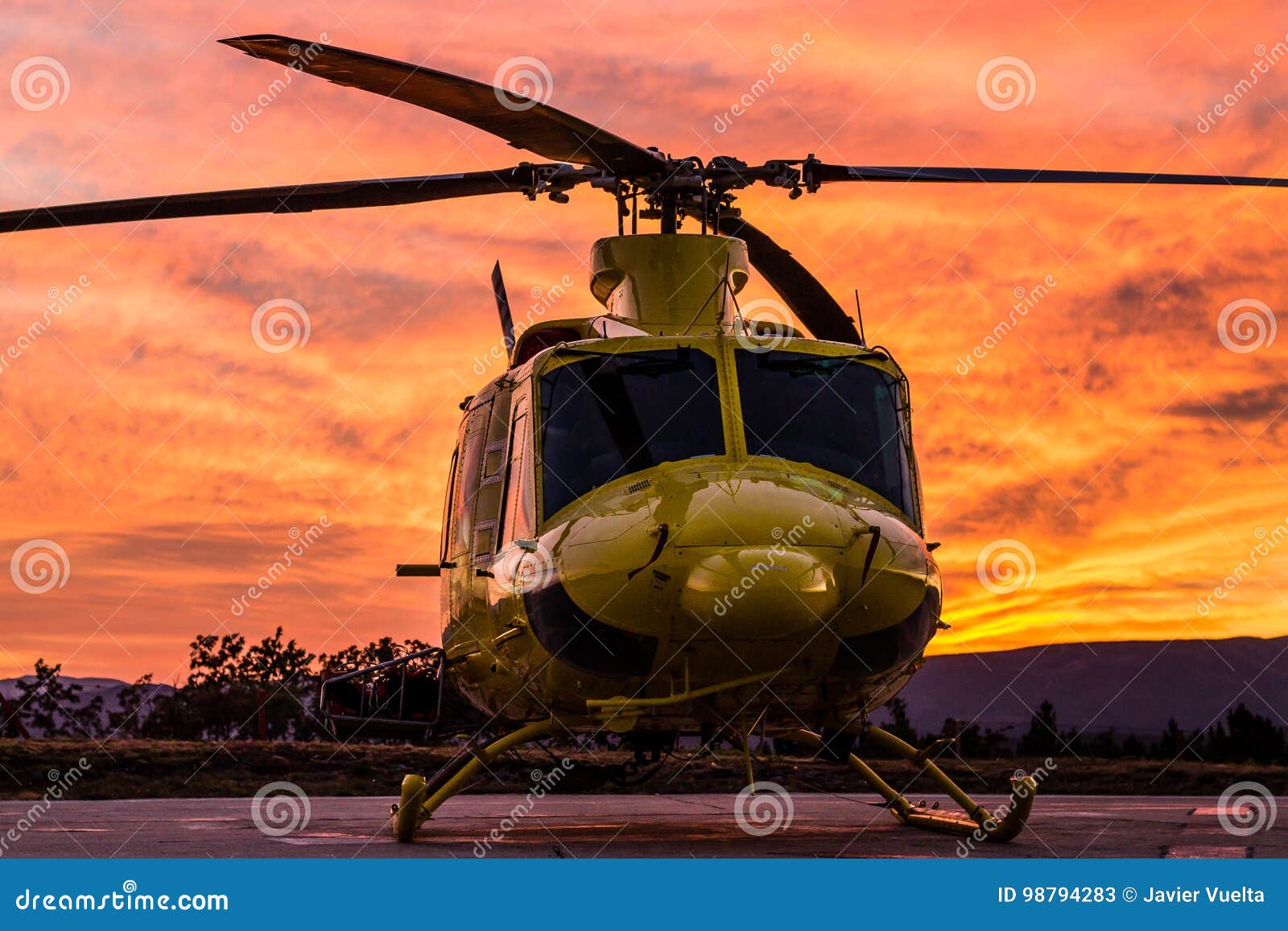 Helicopter on a sunset stock image. Image of helipad - 98794283
