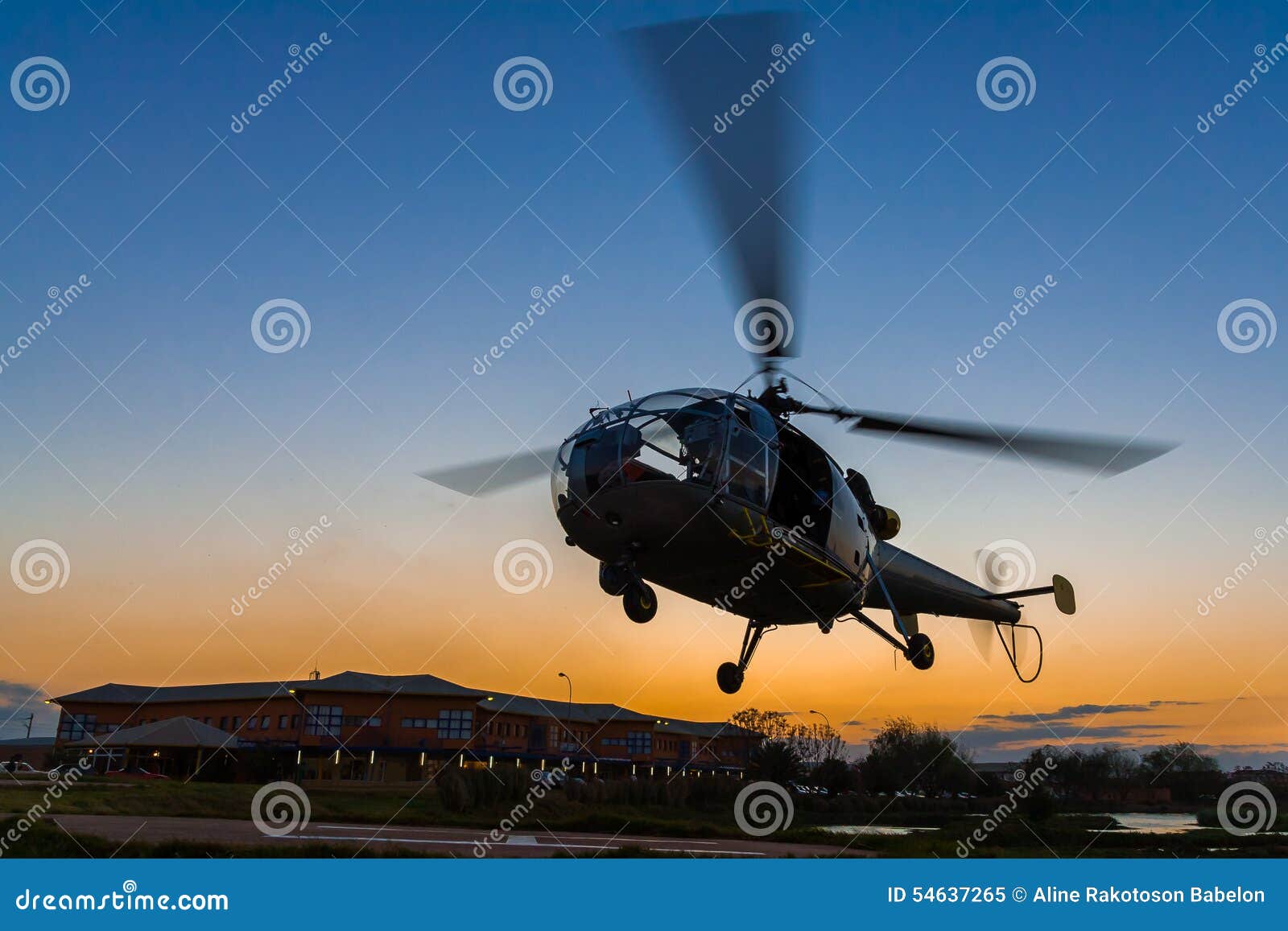Helicopter at sunset stock image. Image of hover, industry - 54637265