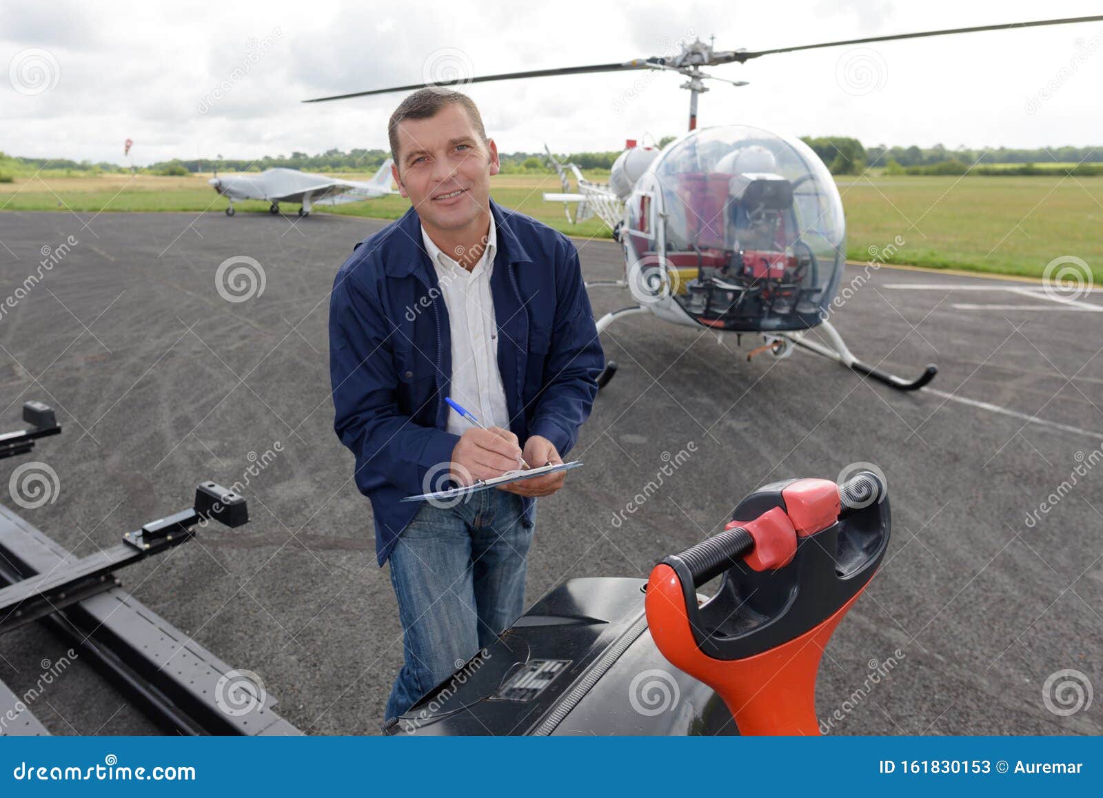 Helicopter Technician Looking at Camera Stock Image - Image of ...