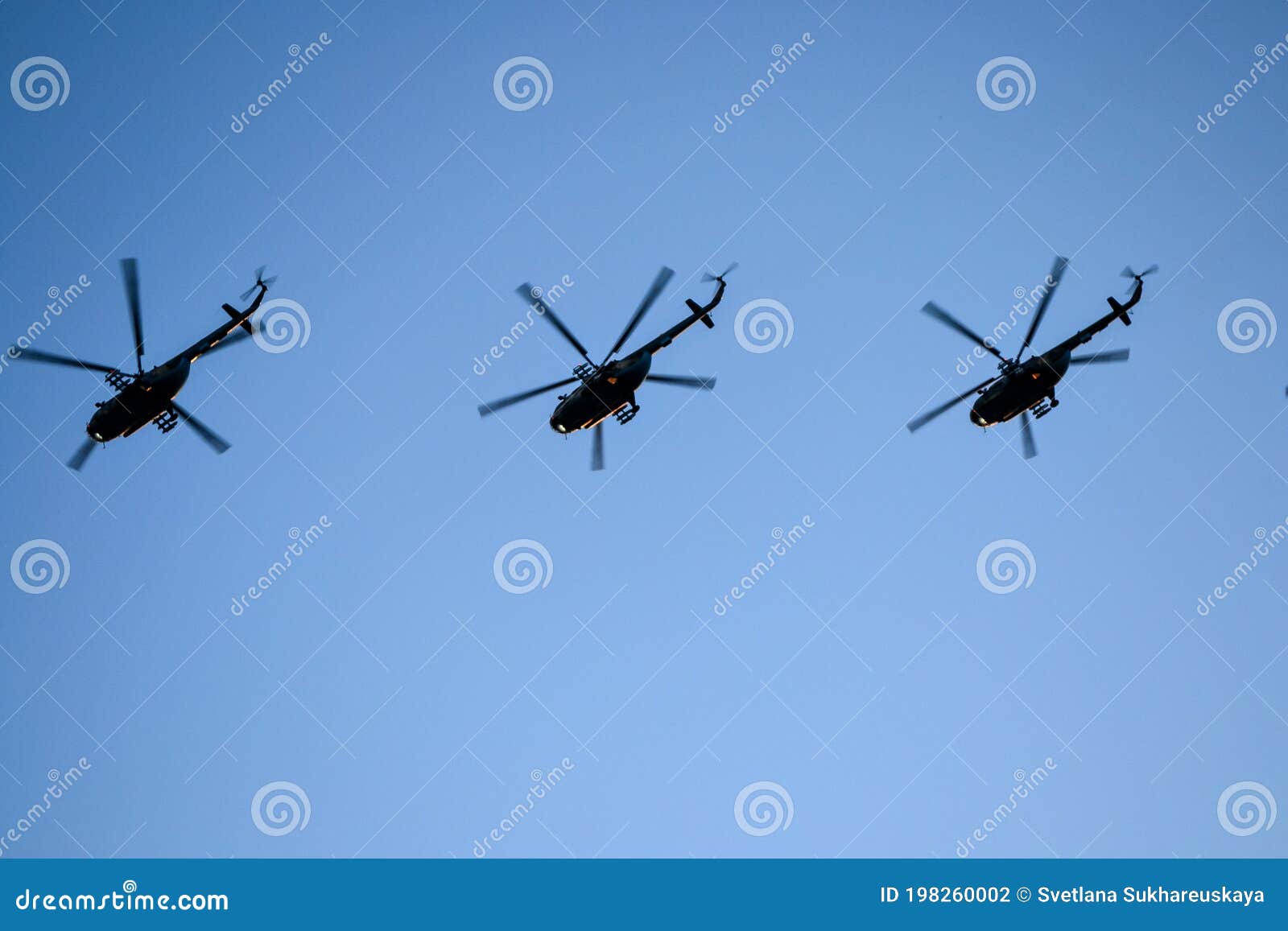 Helicopters in the sky stock photo. Image of aircraft - 198260002