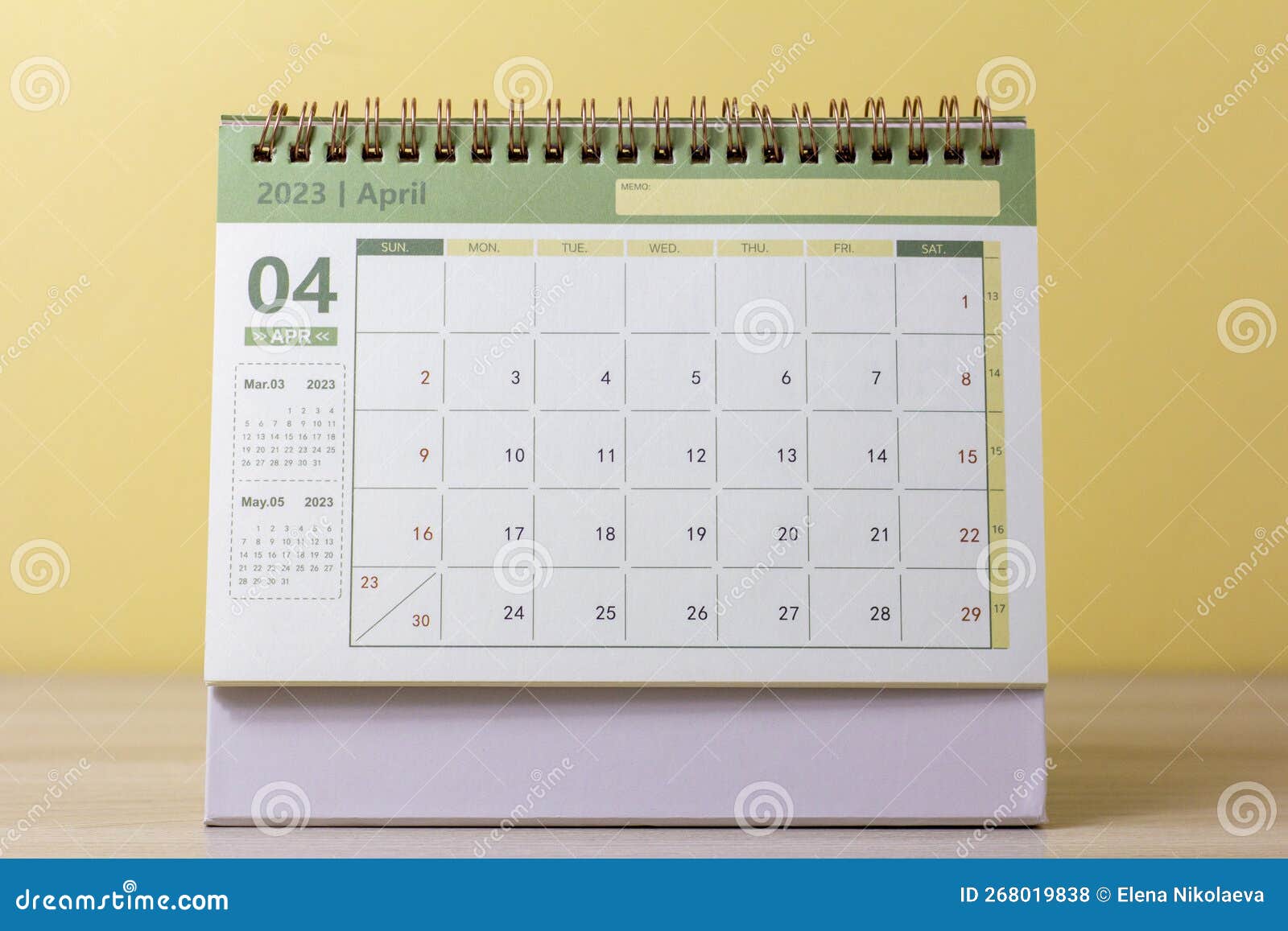 Hello April.Desktop Calendar for April 2023 on the Table. Stock Photo ...