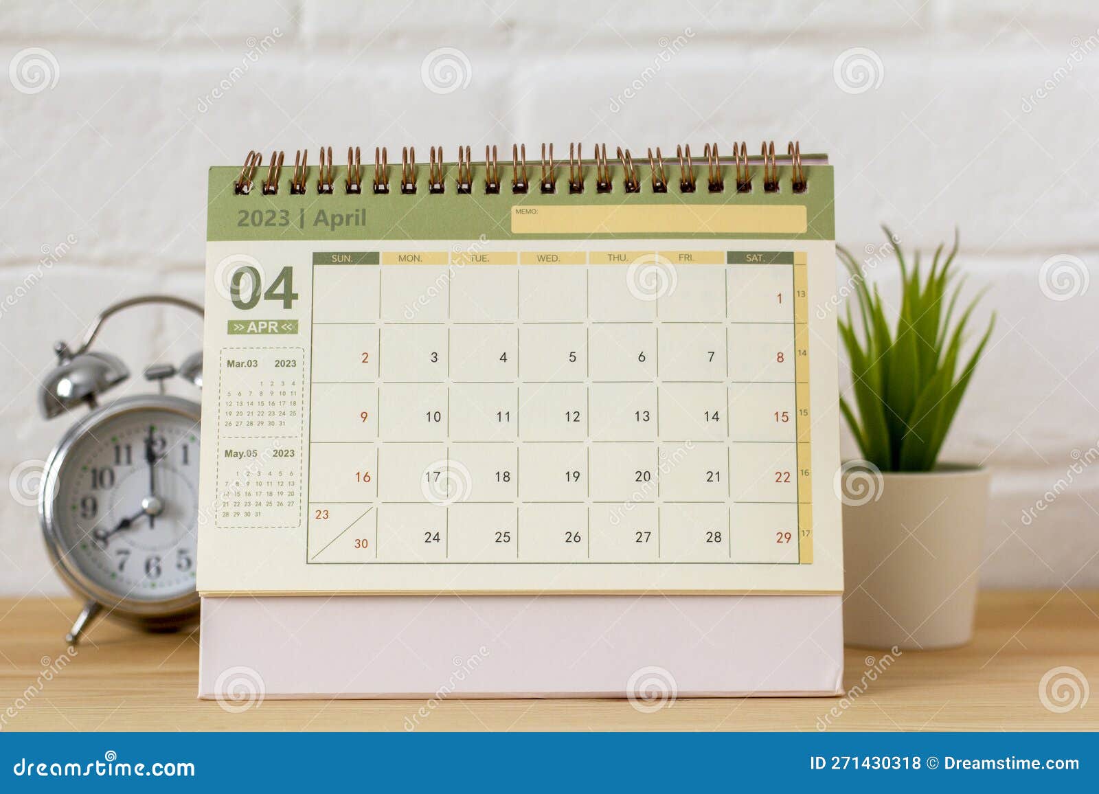 Hello April.Desktop Calendar for April 2023 on the Table. Stock Photo ...