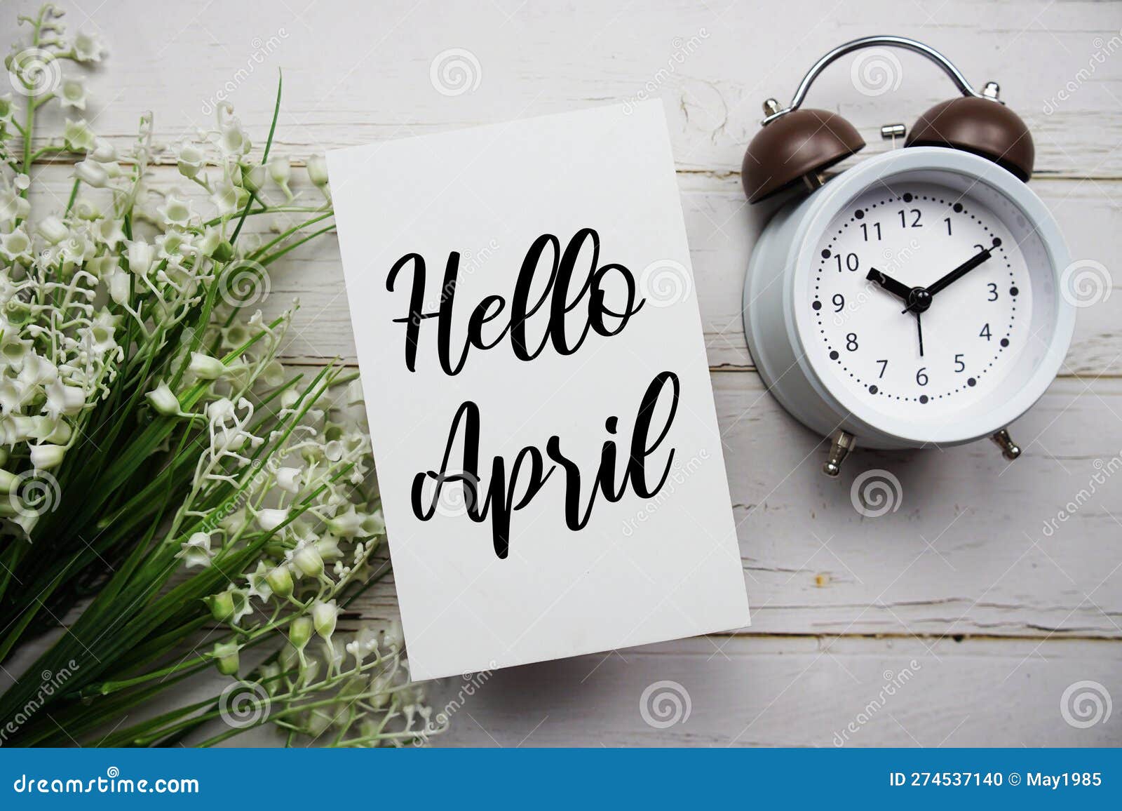 Hello April Text Message with Flower and Alarm Clock on Wooden ...