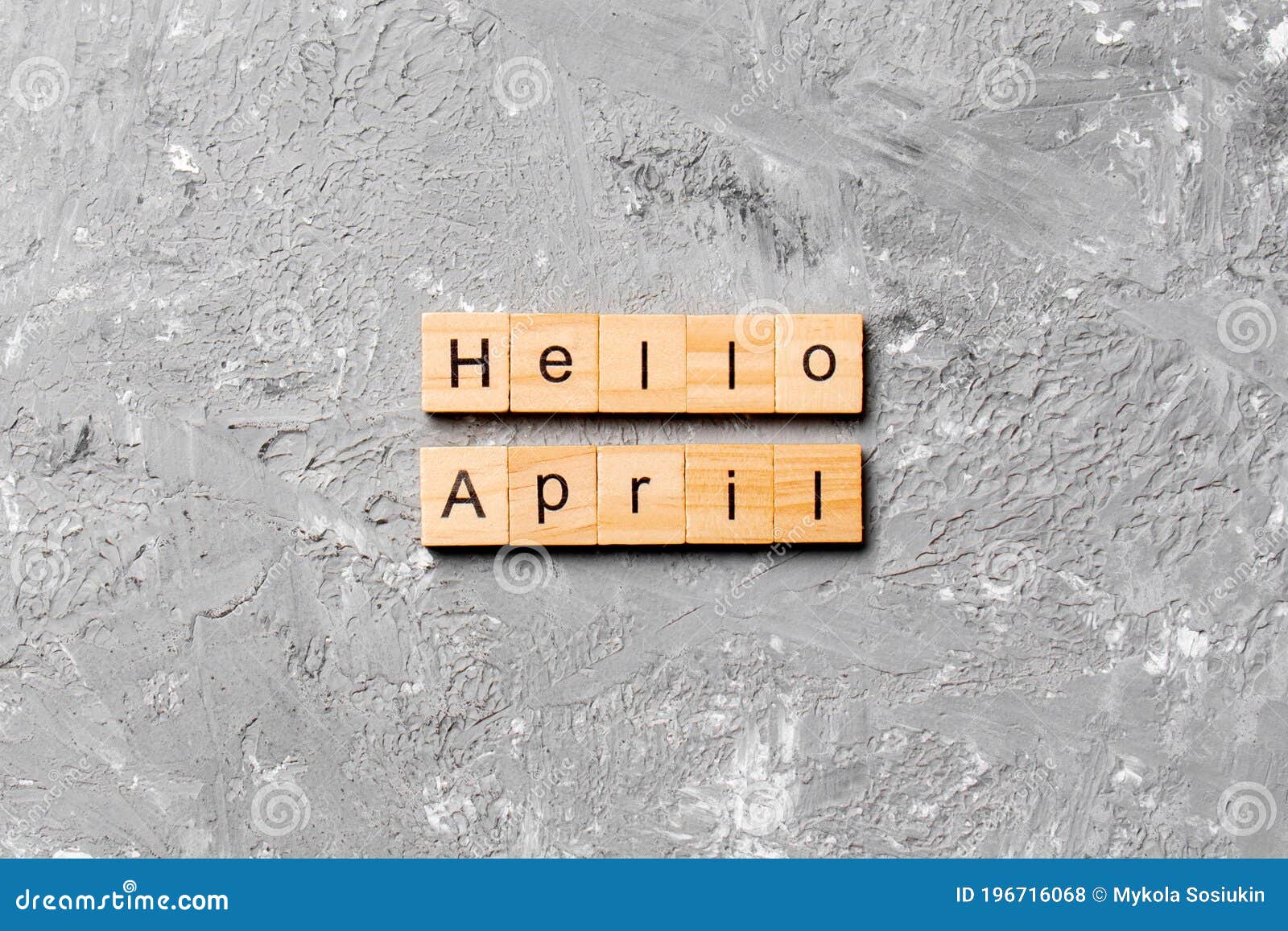 Hello April Word Written on Wood Block. Hello April Text on Table ...
