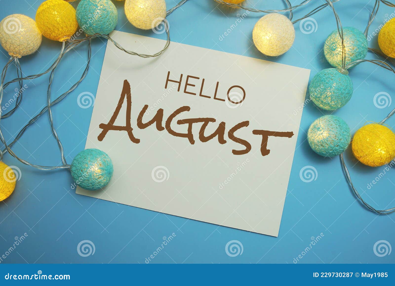 Hello August Typography Text with LED Cotton Ball on Blue Background ...