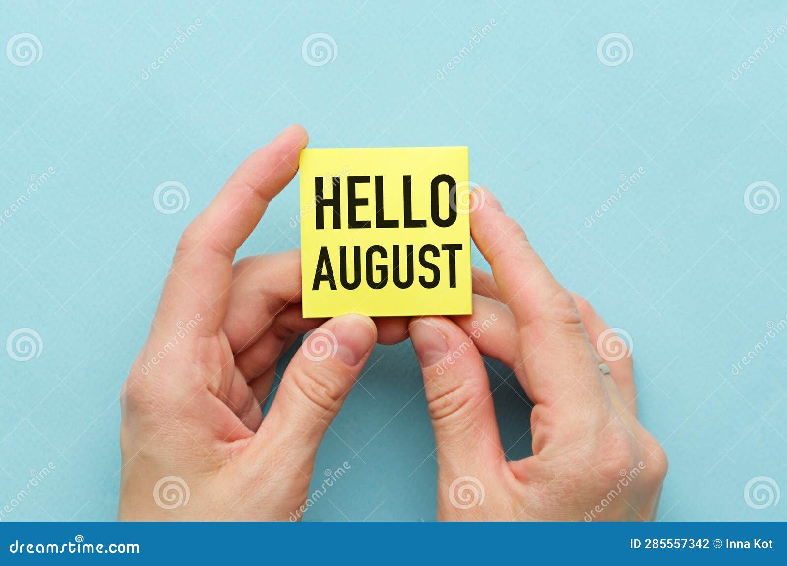 Hello August Written on a Memo Stick. Inspiration in Hands Stock Photo ...