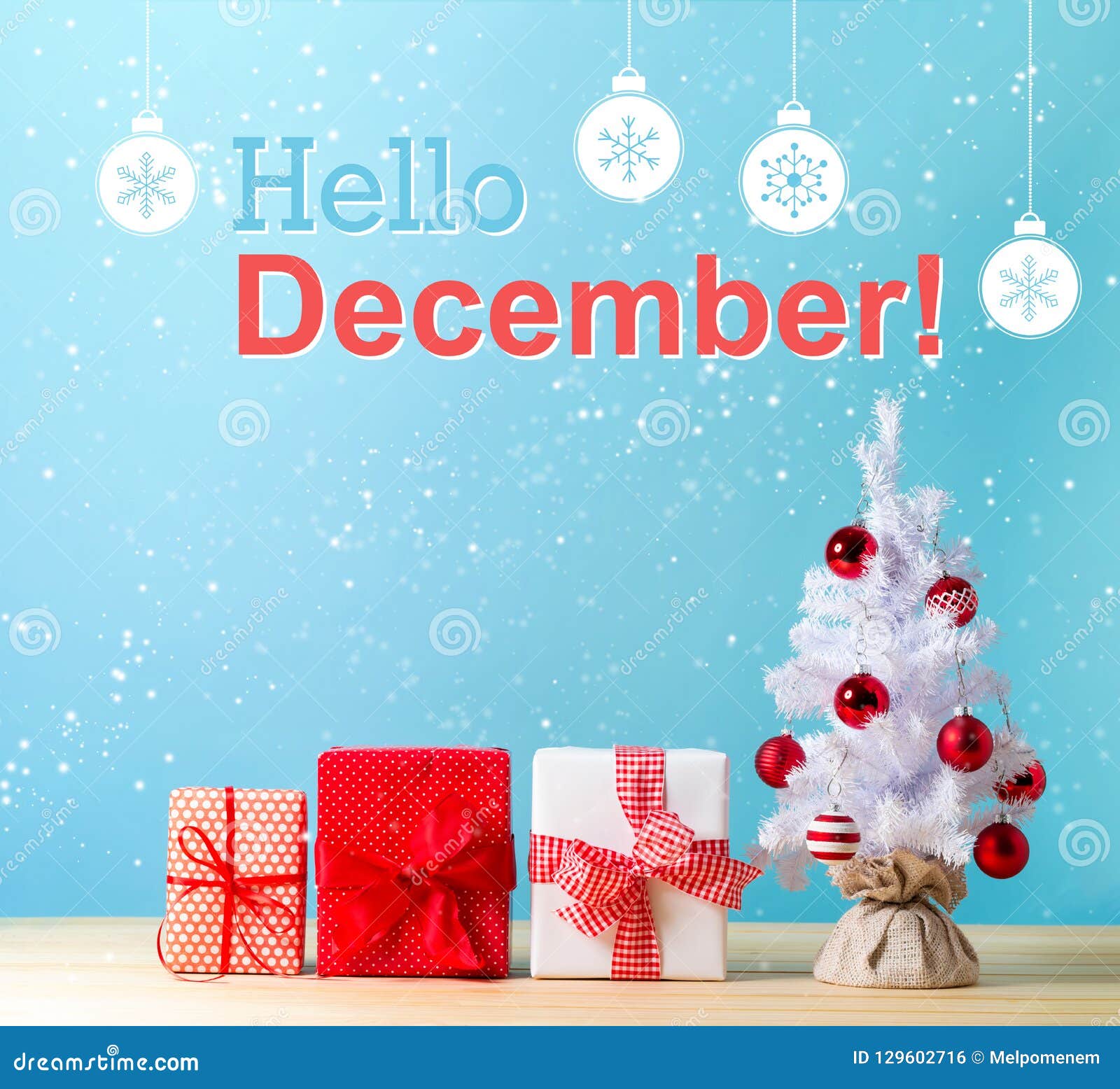 Hello December Message with a Christmas Tree and Gift Boxes Stock Photo ...