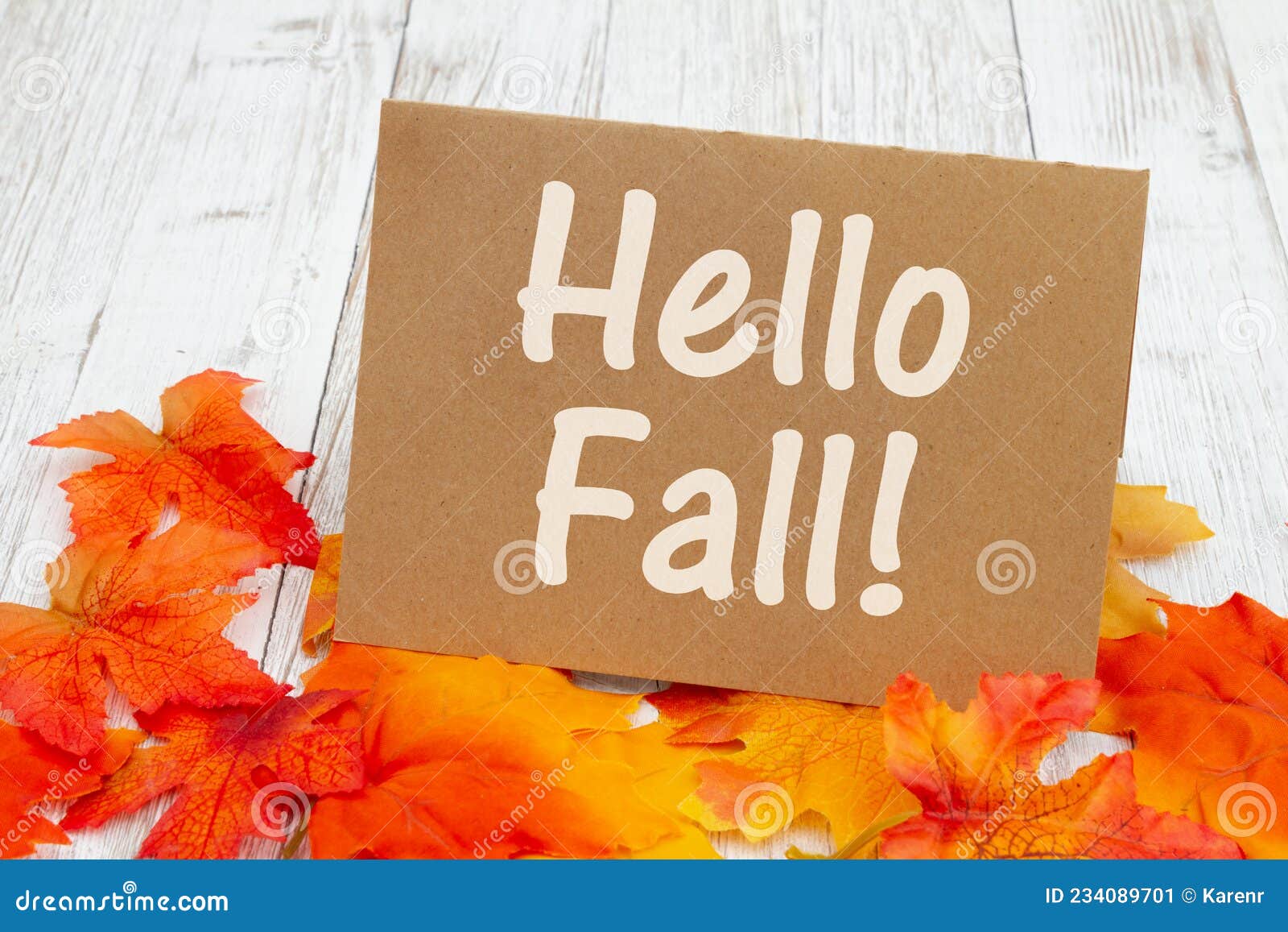 Hello Fall Message on Greeting Card on Weathered Wood with Fall Leaves ...