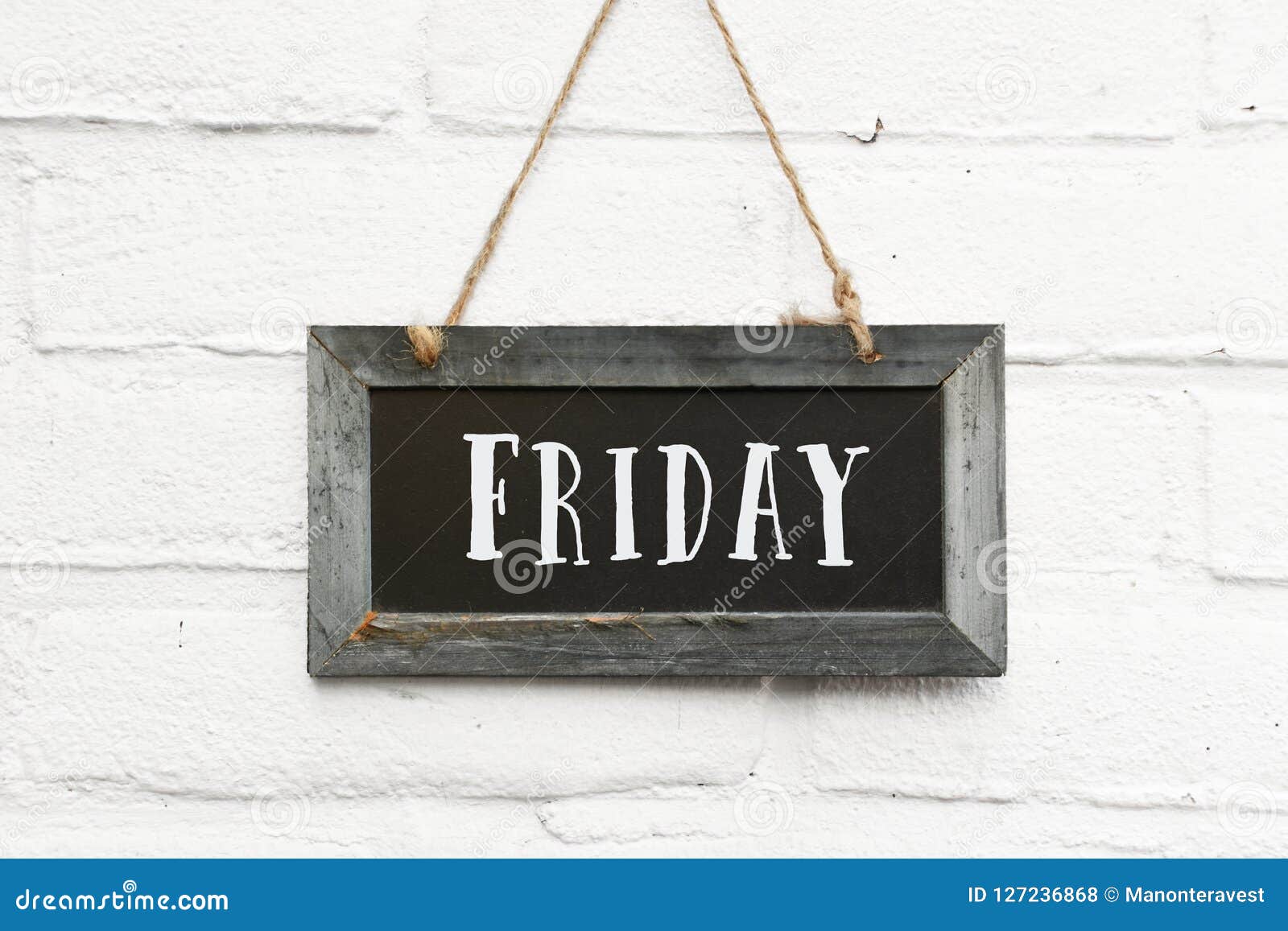 Hello Friday Text on Hanging Board White Brick Outdoor Wall Stock Photo ...