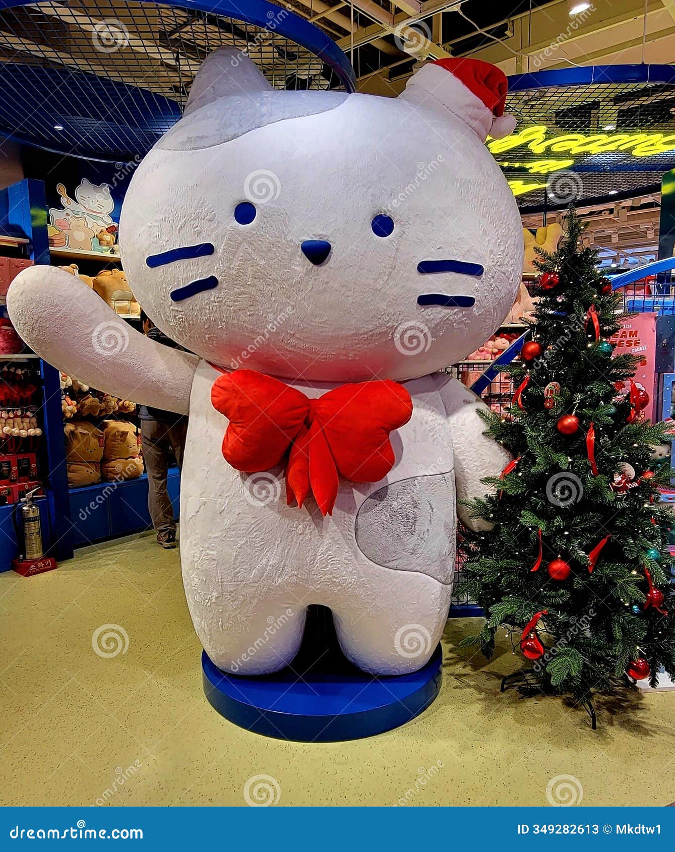 Hello Kitty Standing Next To Christmas Tree Editorial Stock Photo ...