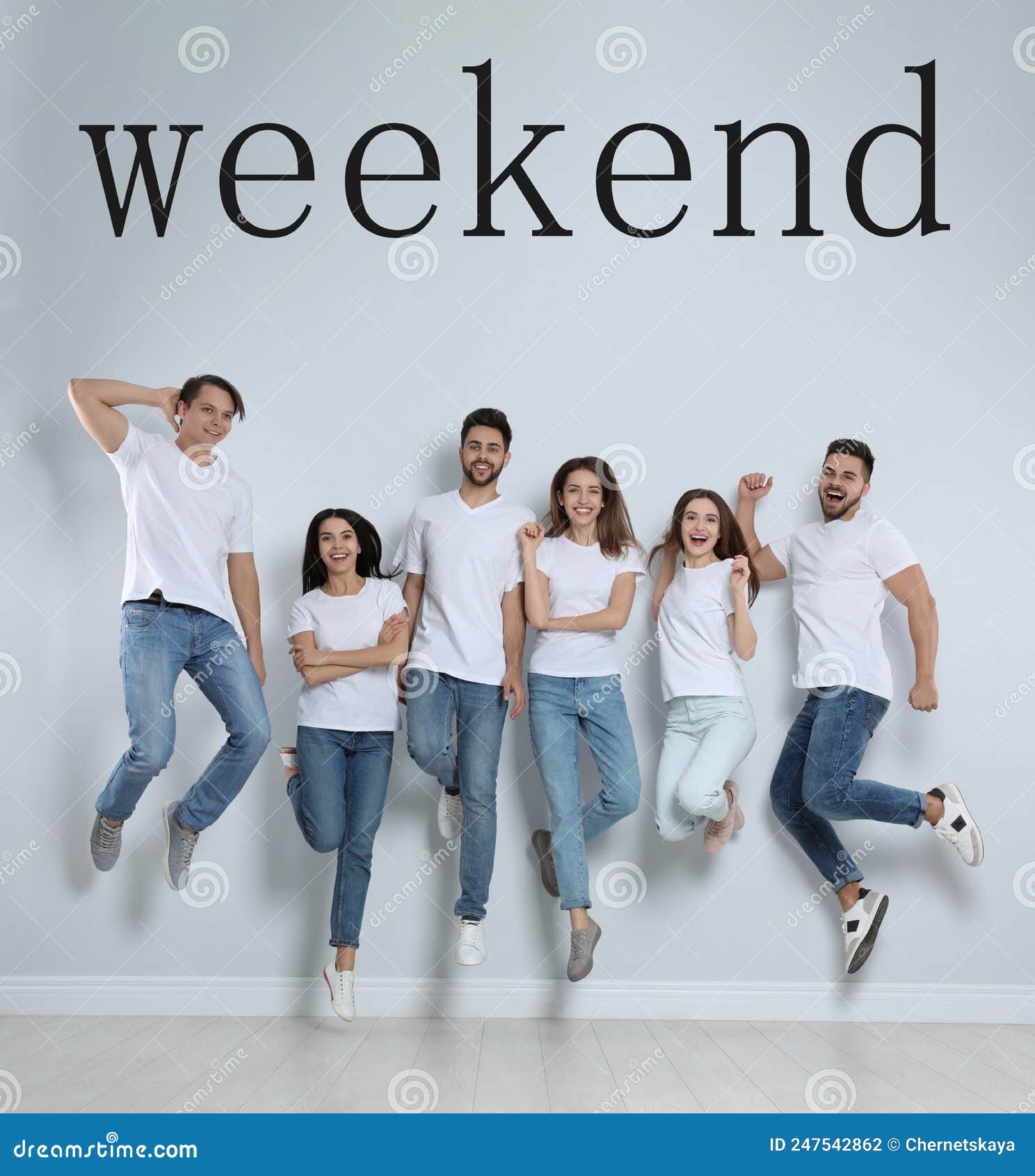 Hello Weekend. Group of Friends Jumping Near Light Wall Stock Photo ...