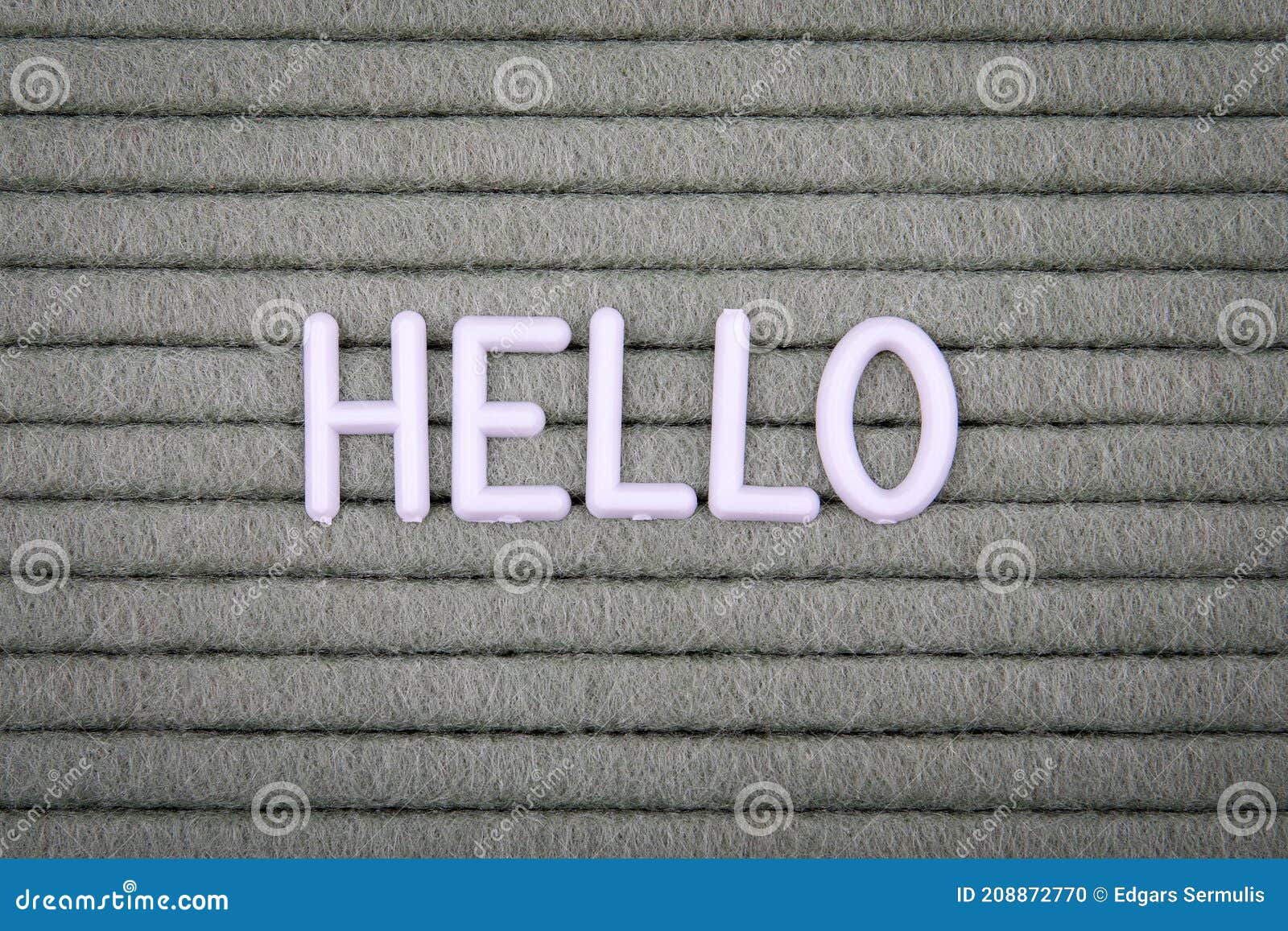 HELLO. White Letters of the Alphabet on a Green Background Stock Photo ...