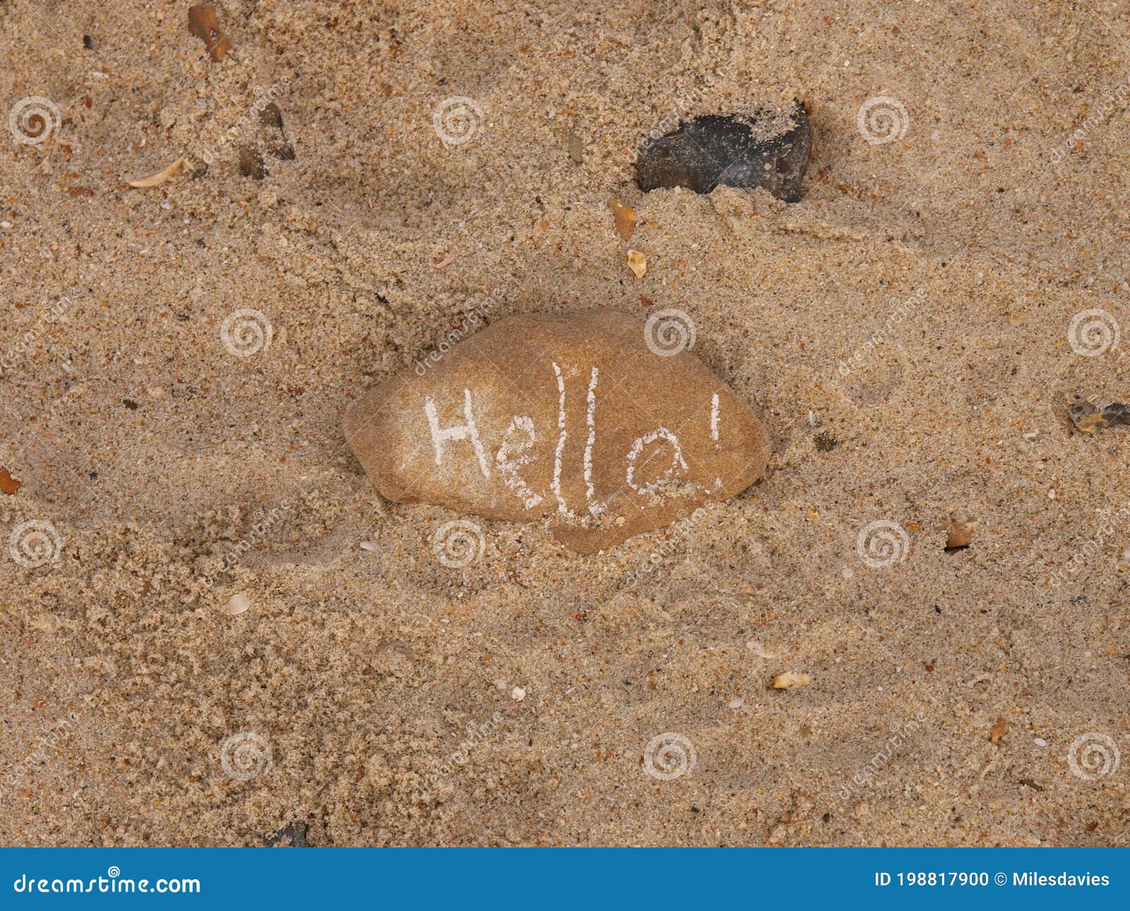Hello Written on a Stone in the Sand Stock Photo - Image of written ...