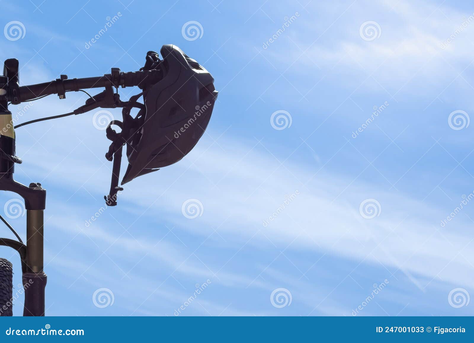 Helmet Hanging from Bicycle Handlebars Stock Image - Image of ...