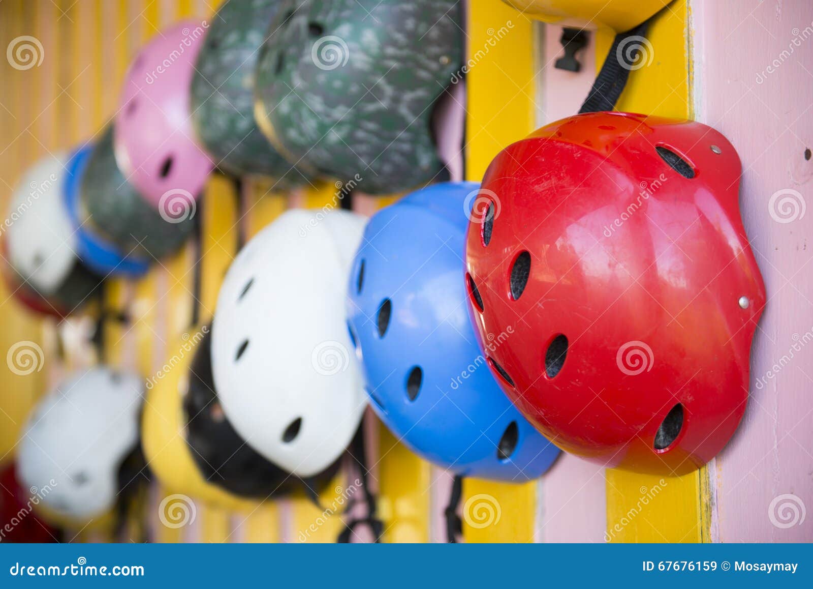 Helmet hanging on the wall stock image. Image of equipment - 67676159
