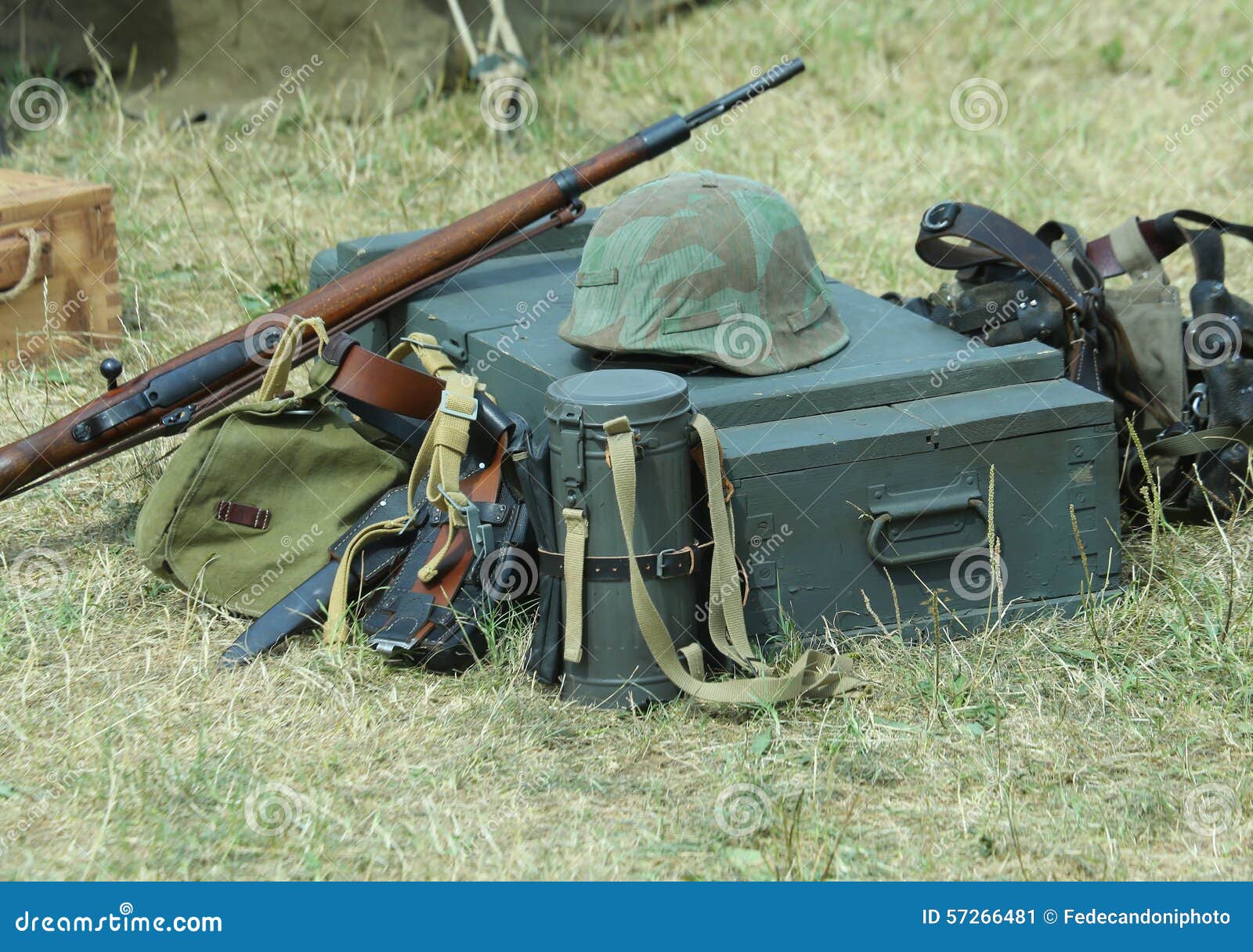 Helmet of Soldier Uniform with a Rifle in the Army Camp Stock Image ...