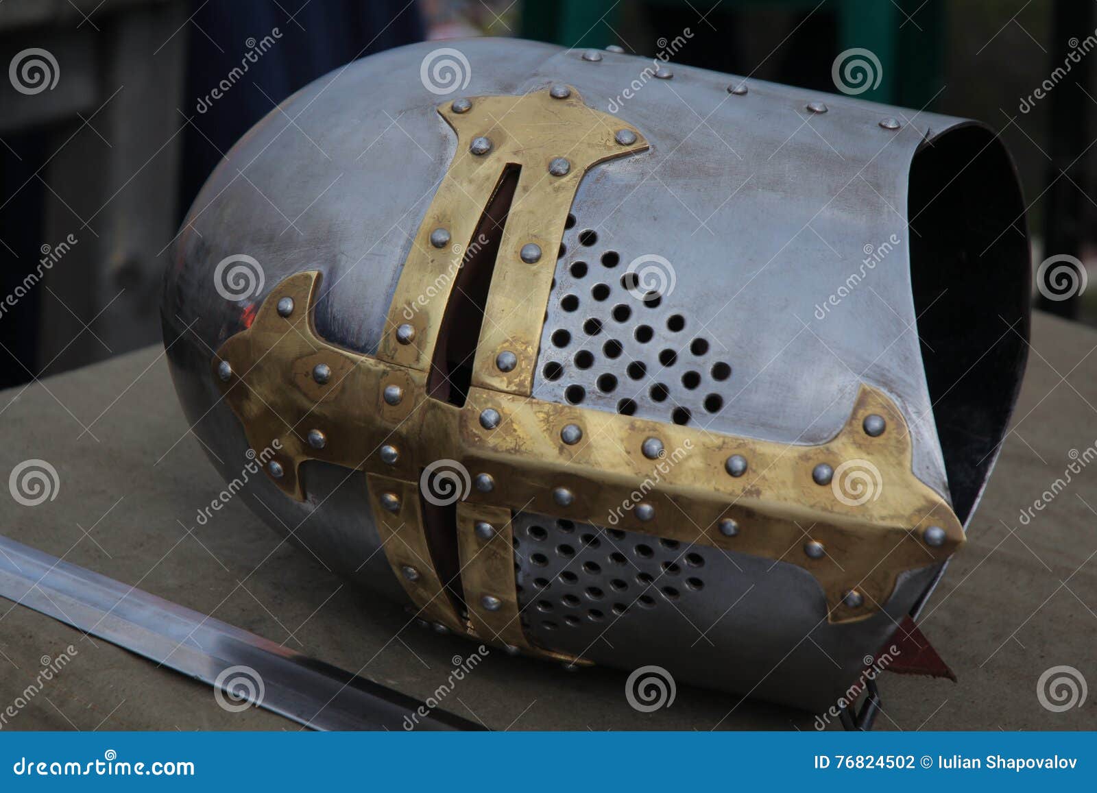 Helmet and sword stock photo. Image of weapon, heavy - 76824502