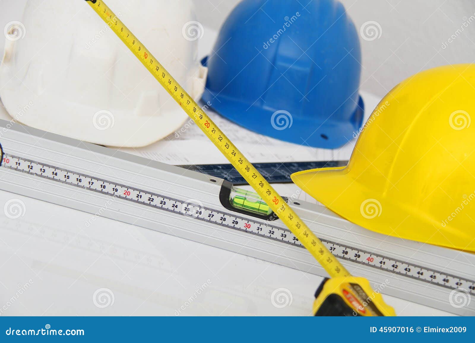 Helmets and Tools for Construction Drawings and Buildings Stock Photo ...