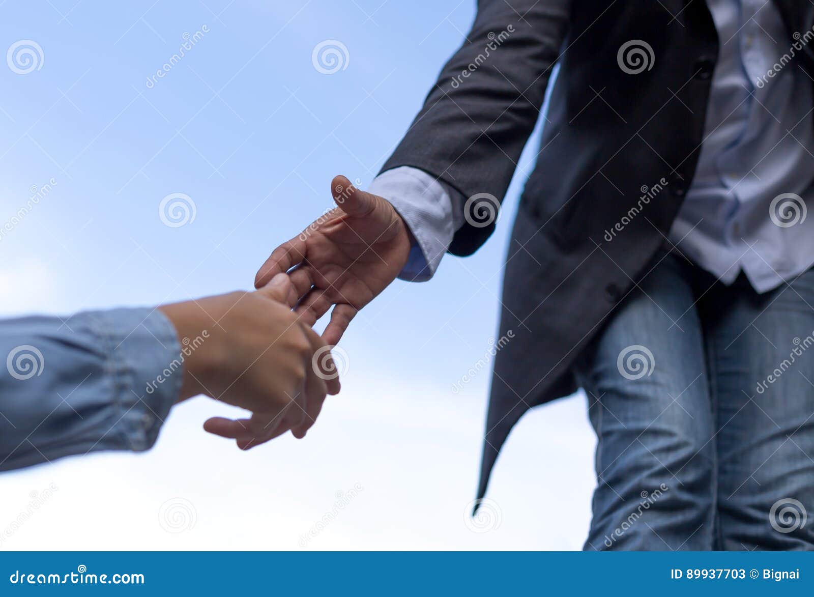 Help Concept Hand Reaching Out To Help Someone with Blue Sky Stock ...
