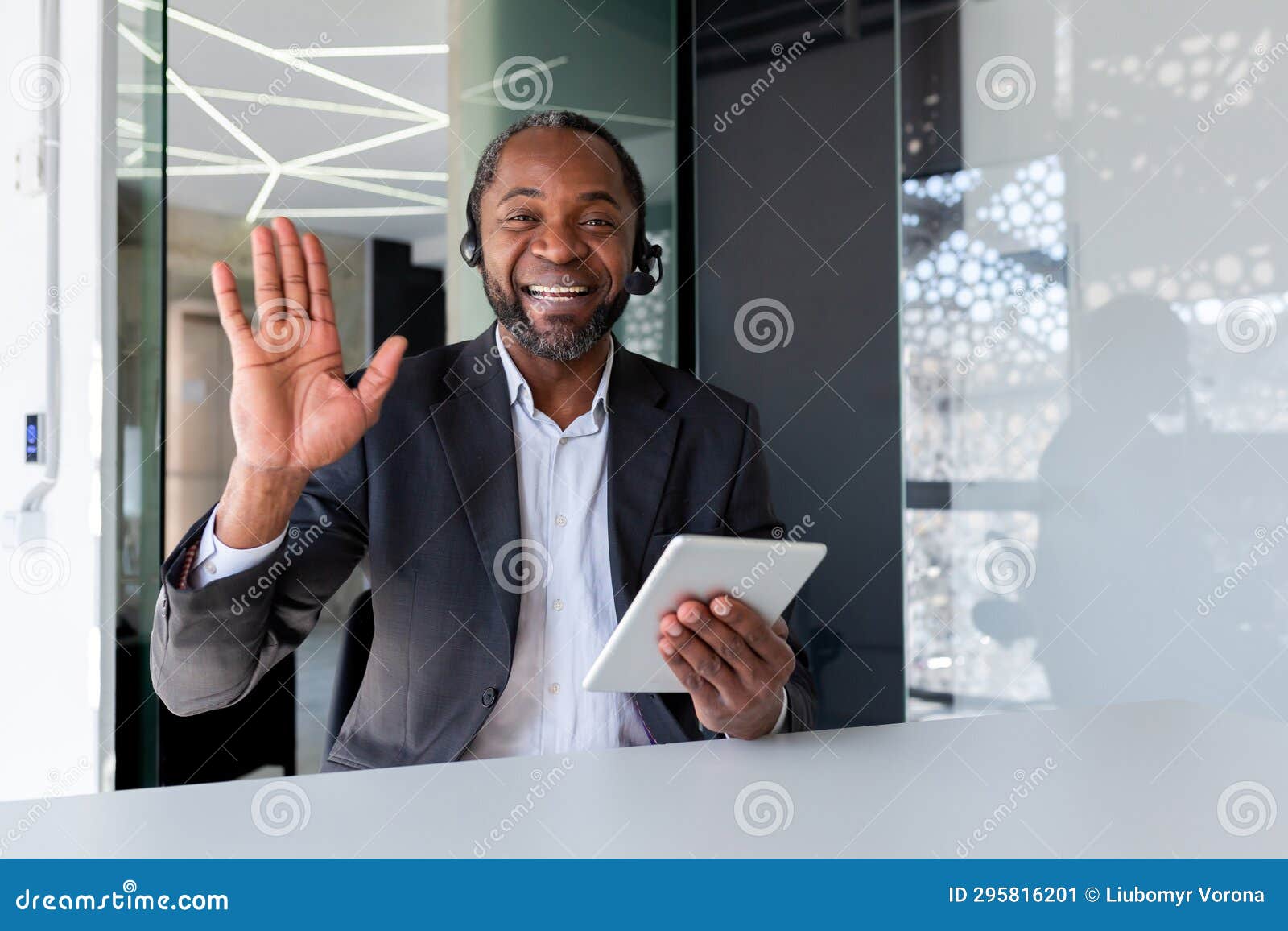 Help Desk Worker Inside Office at Workplace, Man Smiling and Looking at ...