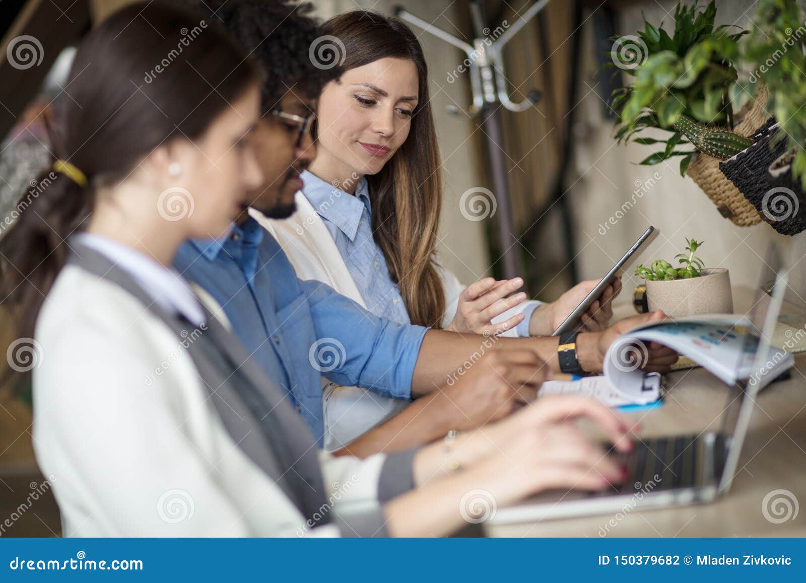 Help each other stock photo. Image of ethnicity, digital - 150379682