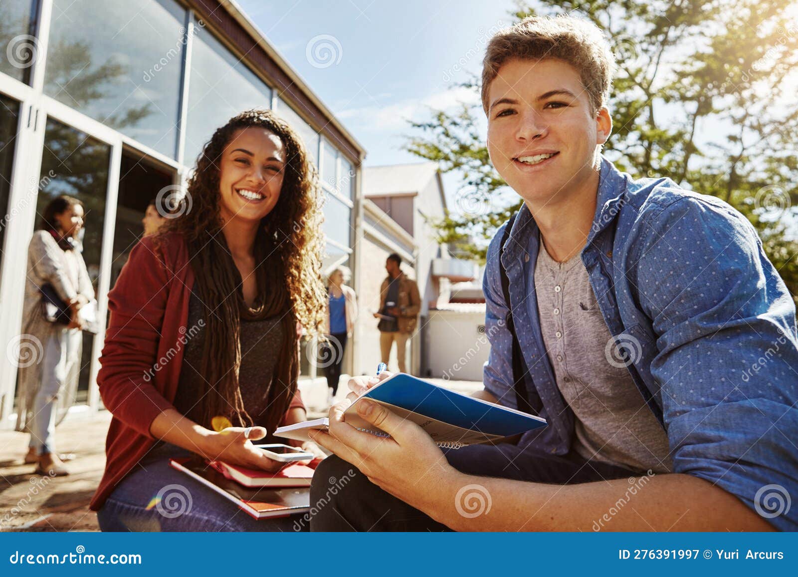 We Help Each Other by Sharing Our Knowledge. Two Students Studying Together on Campus. Stock ...