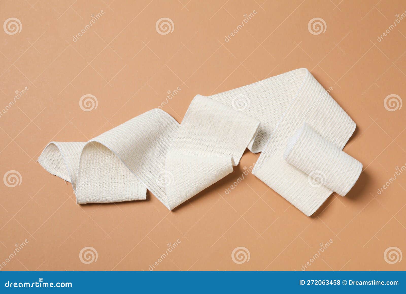 Help during an Injury, Elastic Bandage on Beige Background Stock Photo ...