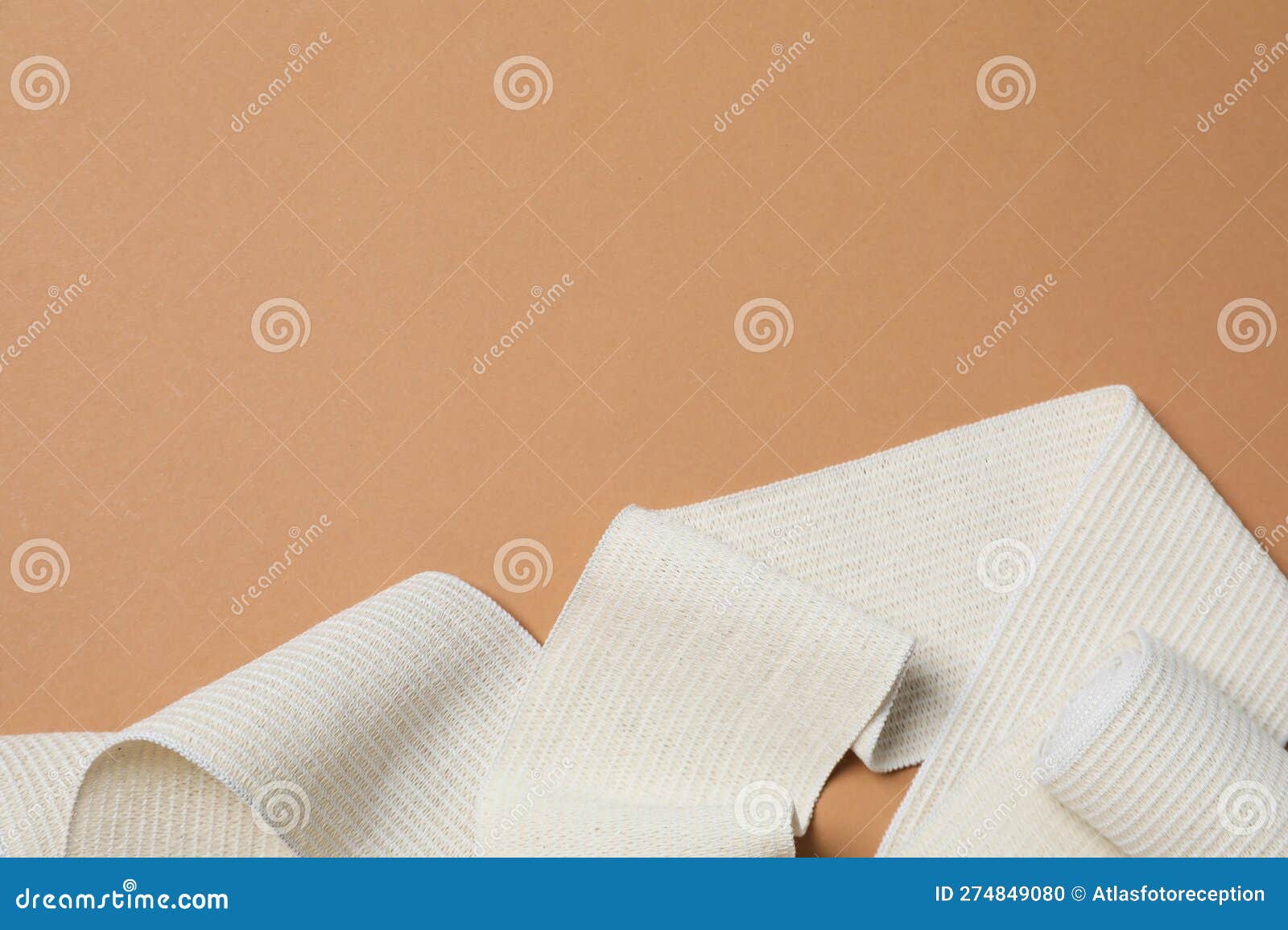 Help during an Injury, Elastic Bandage on Beige Background Stock Photo ...