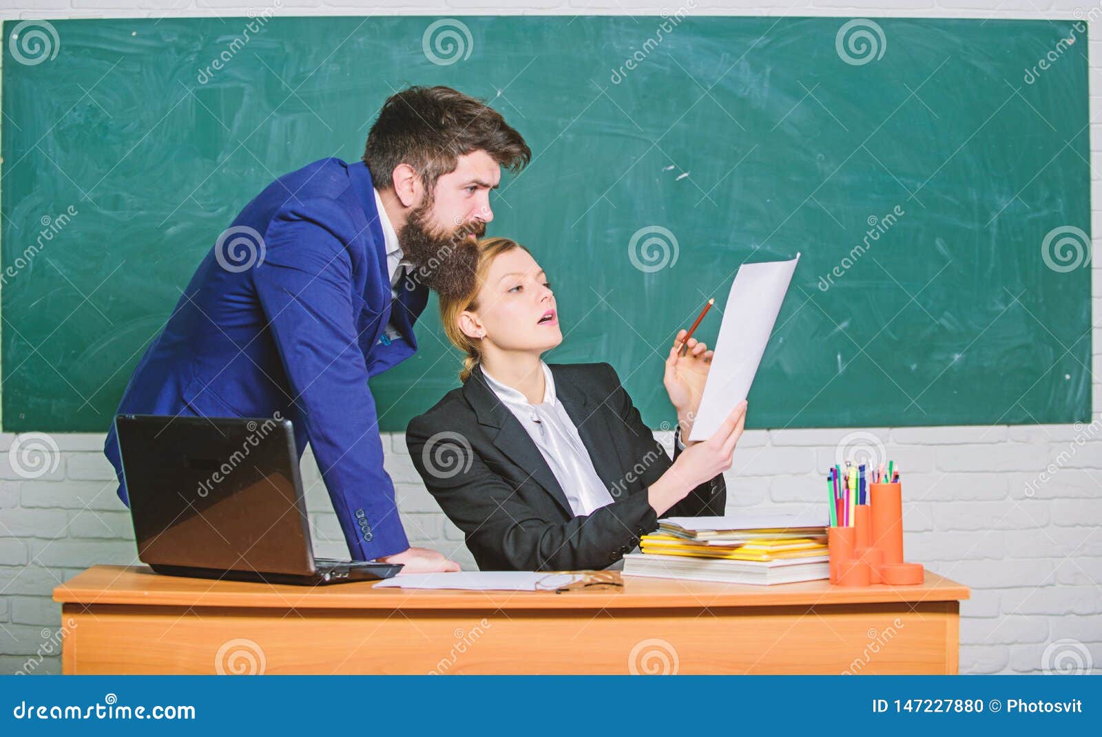 Help Me with Documents. Teacher and Supervisor Working Together in ...