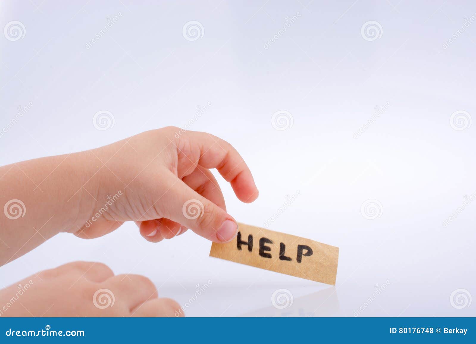 Help word on a piece paper stock photo. Image of piece - 80176748