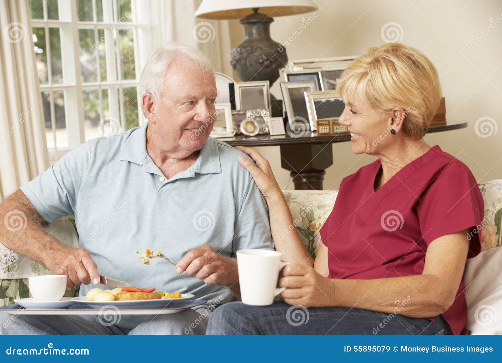 Helper Serving Senior Man with Meal in Care Home Stock Image - Image of ...