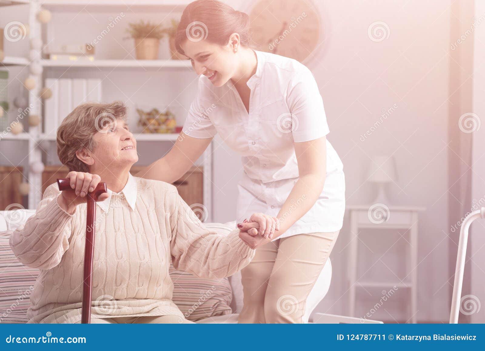 Helpful Caregiver Supporting Smiling Senior Woman With Walking Stick Stock Image Image Of